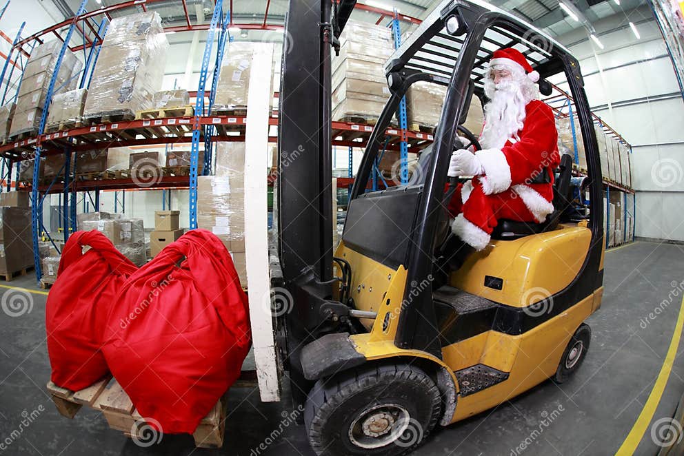Santa Claus Forklift Operator in Warehouse Stock Image - Image of ...