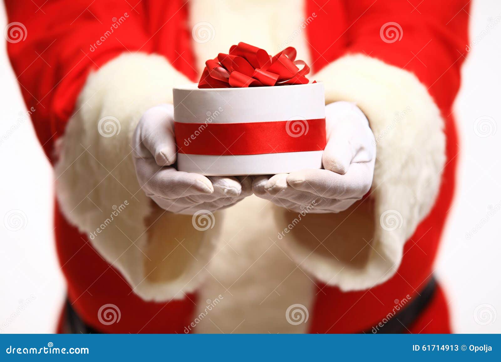 Santa Claus Gloved Hands Holding Gift Box Stock Image - Image of ...