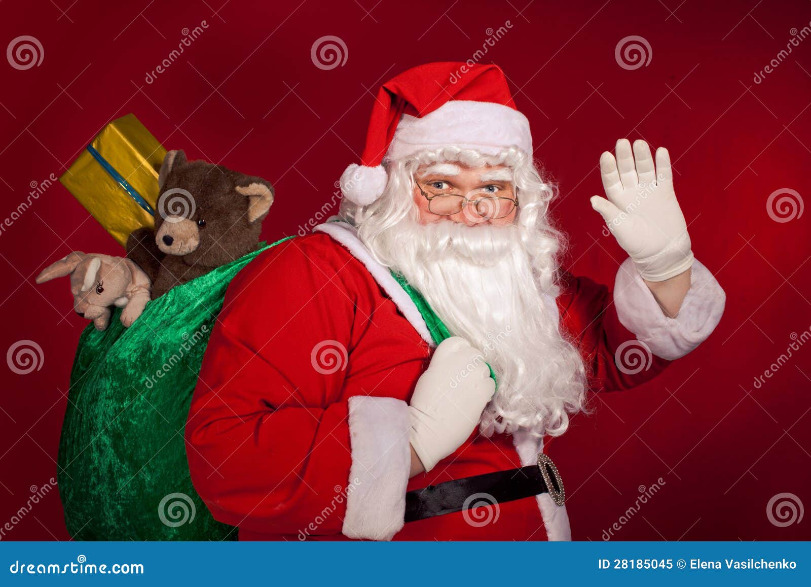 Santa Claus Greeting and Holding His Bag Stock Image - Image of hands ...
