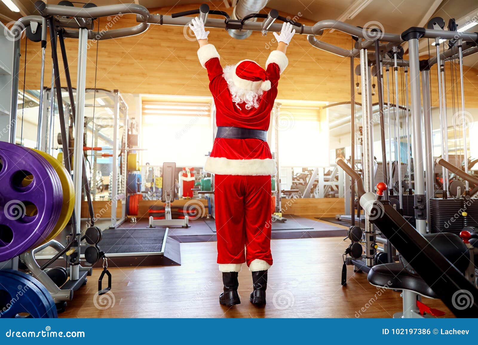 Santa Claus in the Gym Doing the Exercises Stock Photo - Image of ...
