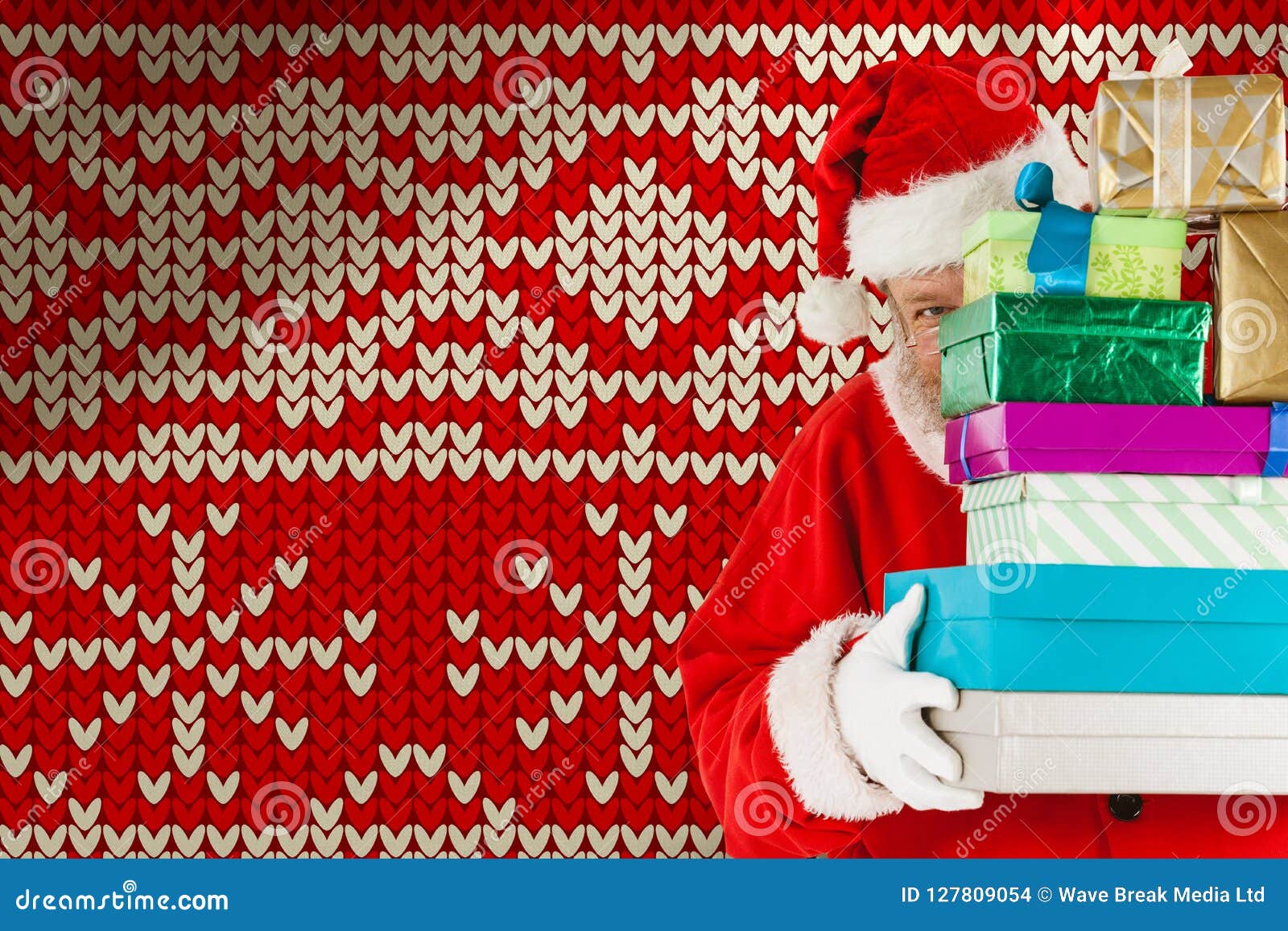 Composite Image of Santa Claus Hiding Behind Stack Christmas Gifts ...