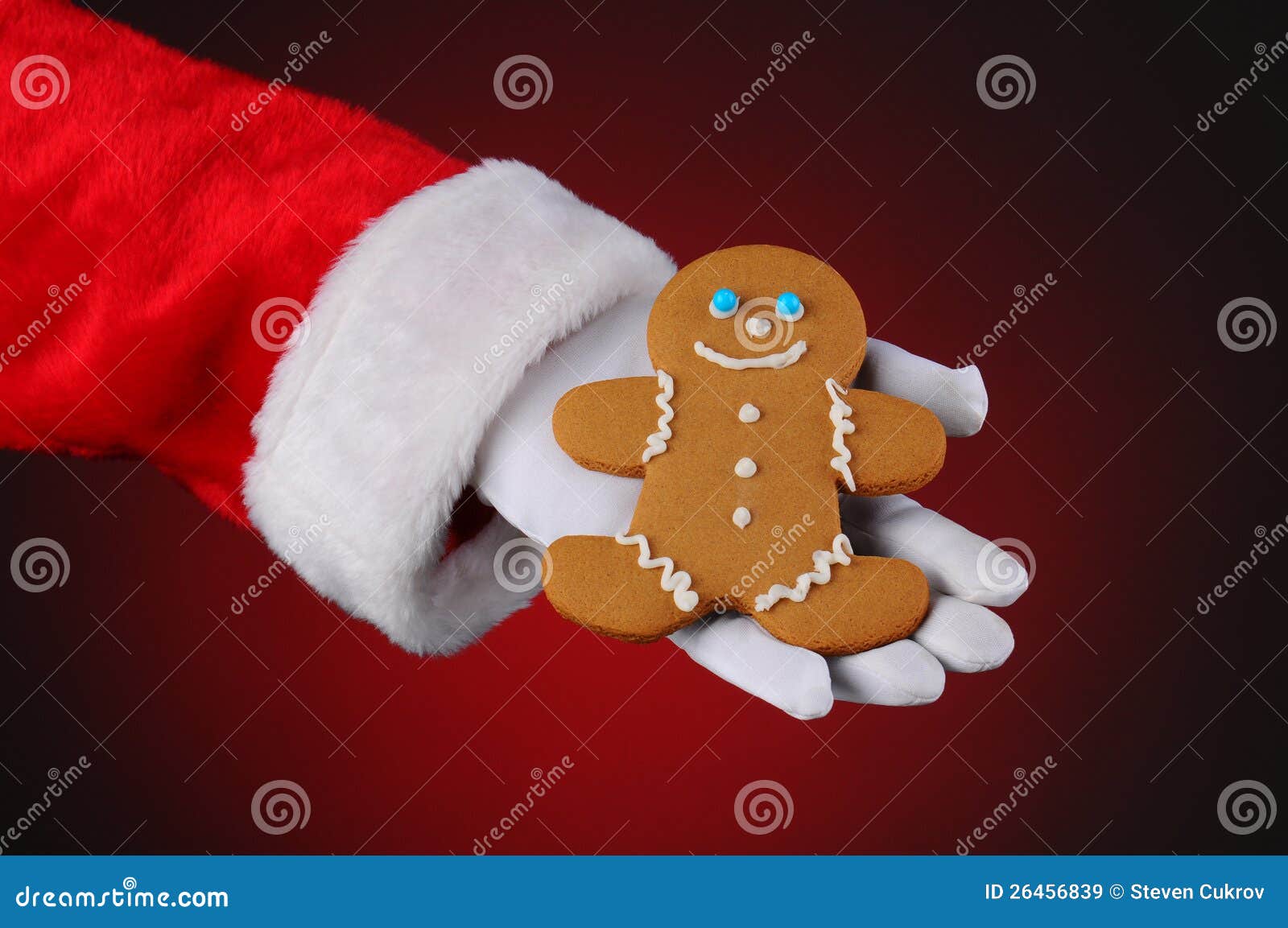 Santa Claus Holding Gingerbread Man in His Hand Stock Image - Image of ...