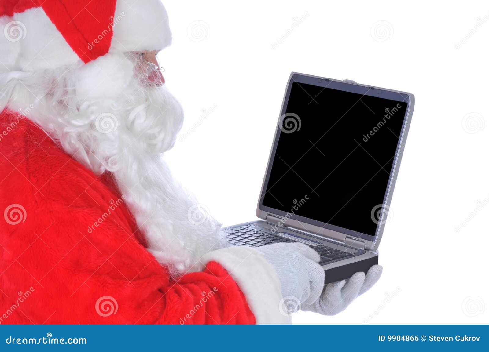 Santa Claus Holding a Laptop Computer Stock Photo - Image of background ...