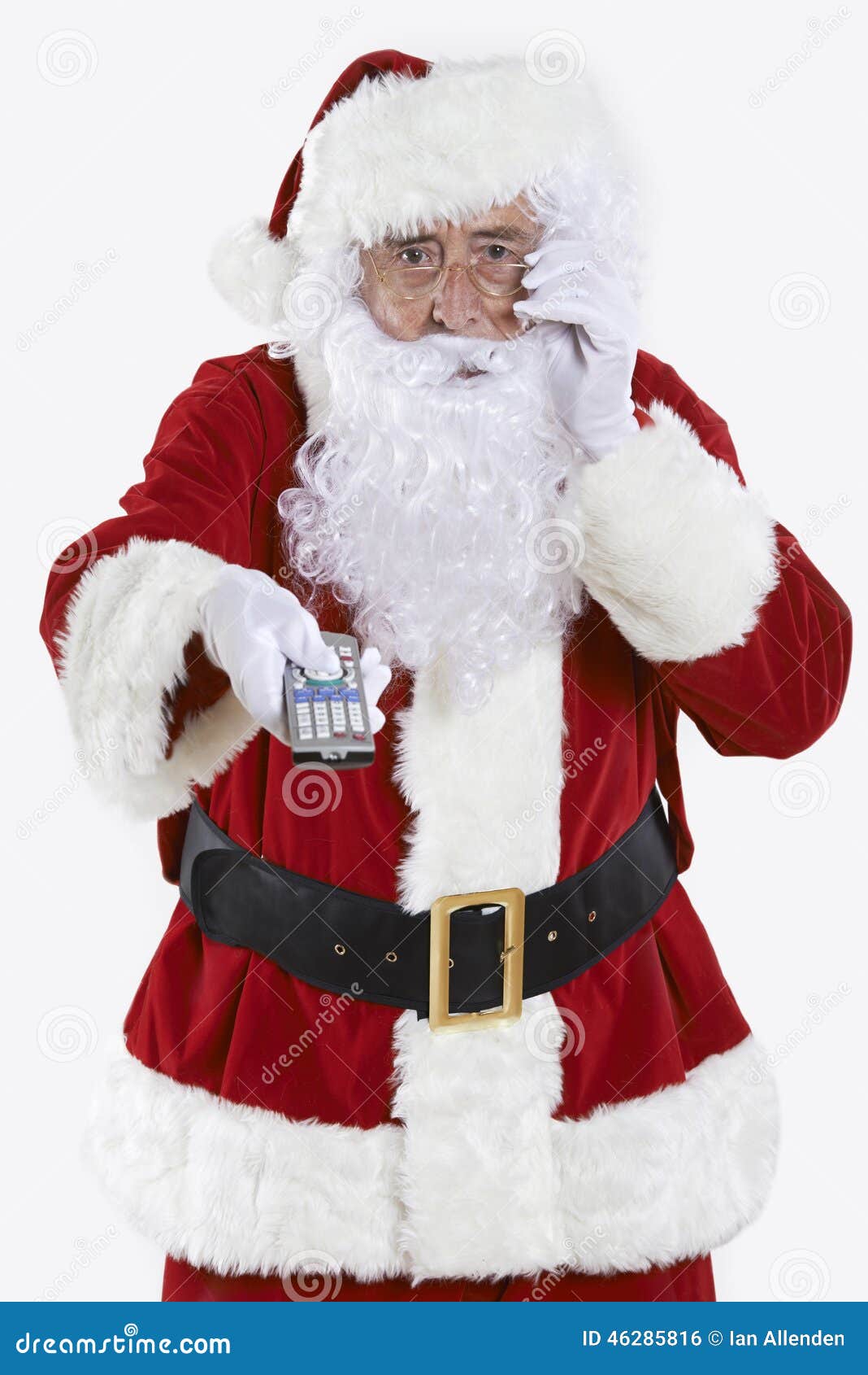 Santa Claus Holding Television Remote Control Stock Photo - Image of ...