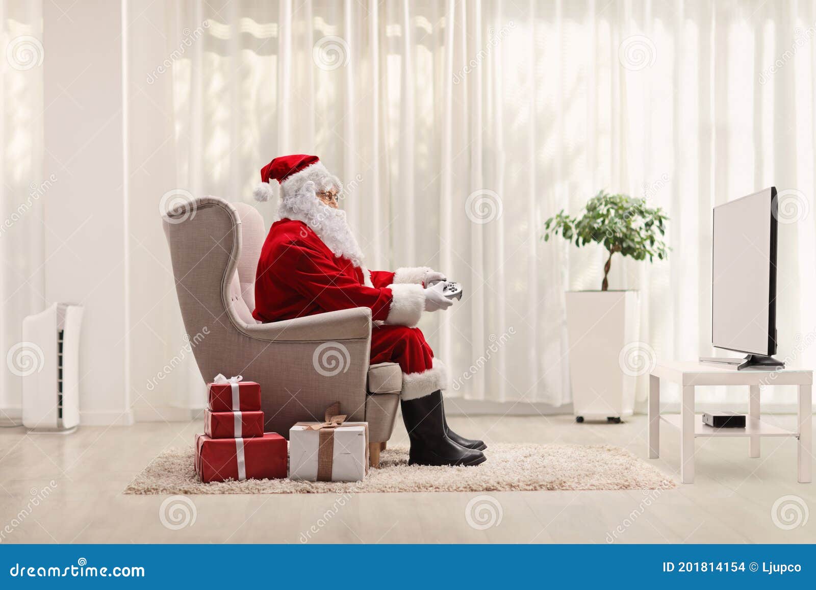 Santa Claus with a Joystick Playing Video Games Stock Photo - Image of ...