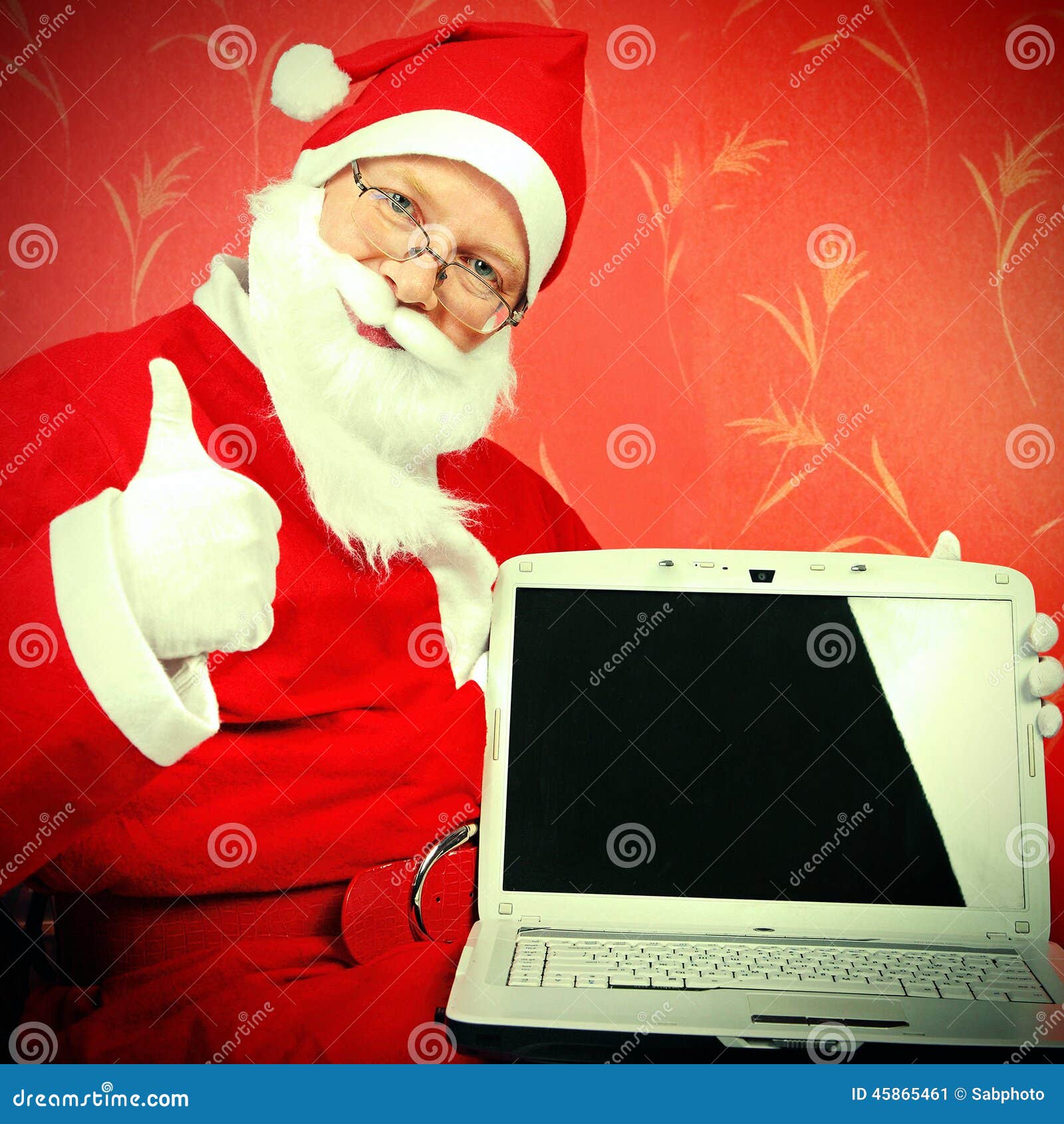 Santa Claus with Laptop stock image. Image of handsome - 45865461