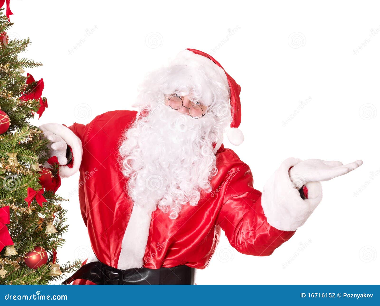 Santa Claus Near Christmas Tree Pointing. Stock Photo - Image of ...