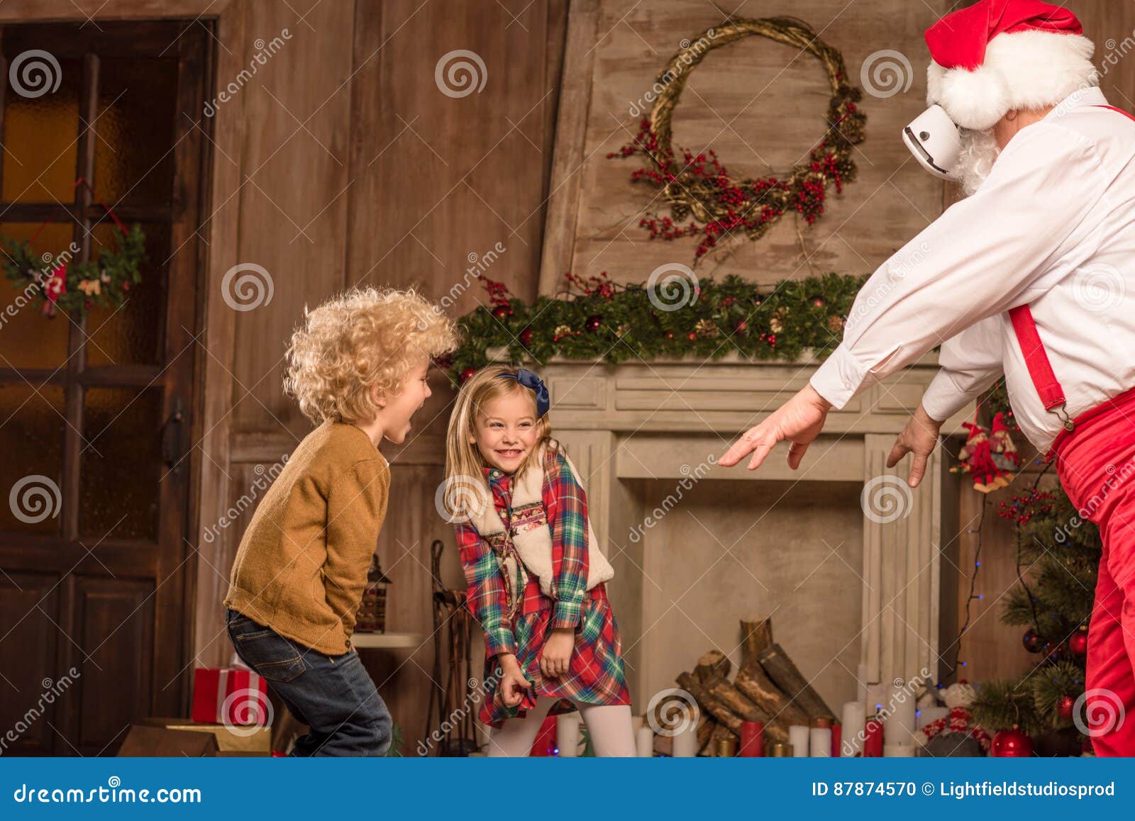 Santa Claus Playing with Children Stock Photo - Image of holiday, santa ...