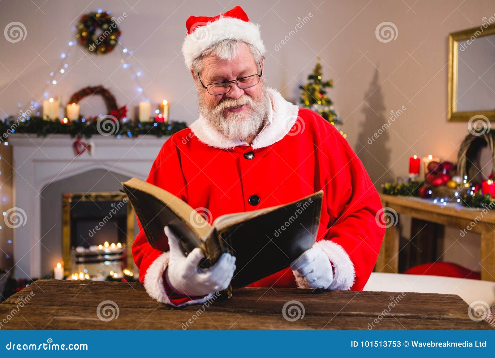Santa Claus reading book stock image. Image of homey - 101513753