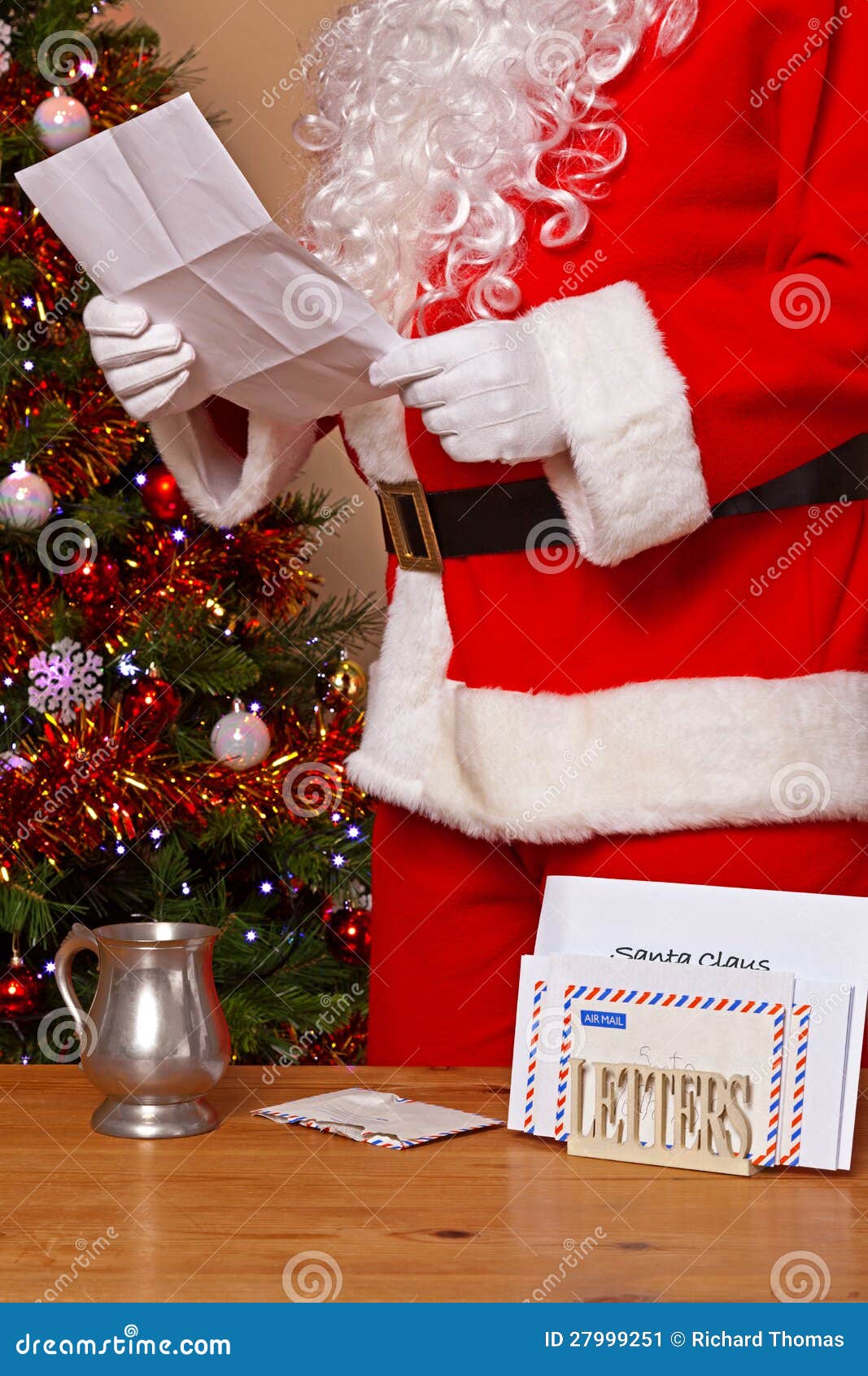 Santa Claus Reading Letters Stock Image - Image of male, people: 27999251