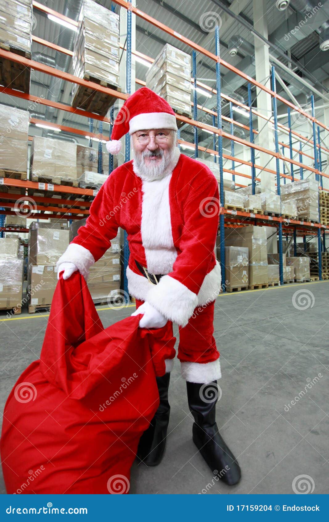 Santa Claus with Red Sack in Storehouse Stock Photo - Image of product ...