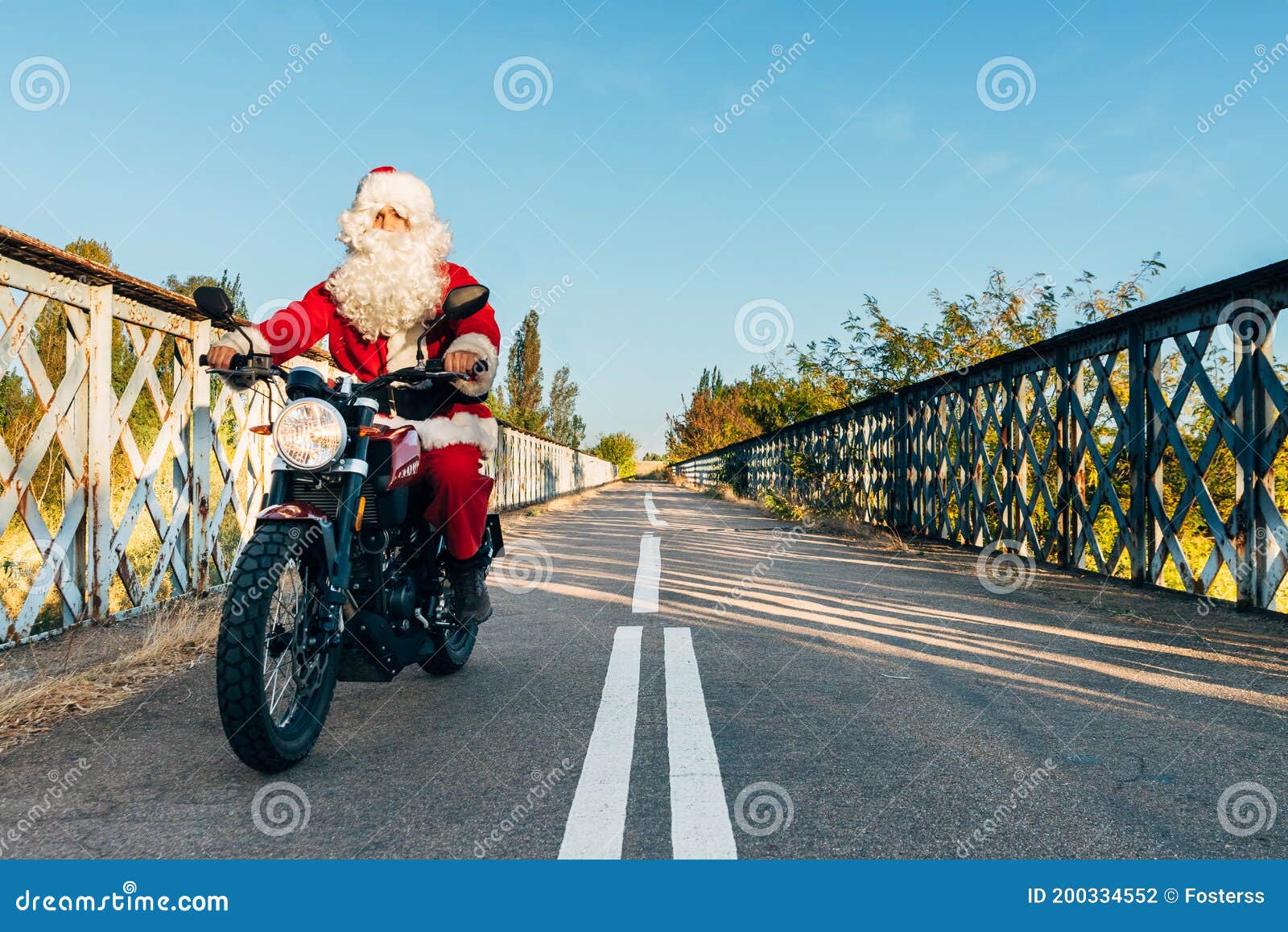 Santa Claus Riding a Motorcycle on the Road Stock Photo - Image of ...