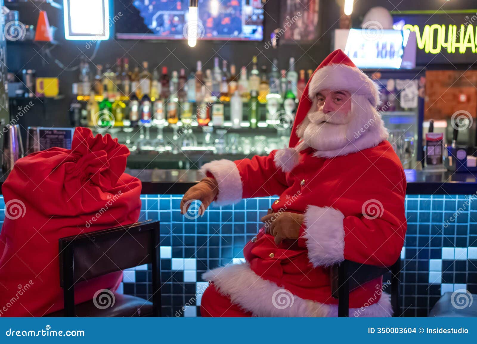 Santa Claus Sits at the Bar in a Pub. Stock Photo - Image of smiling ...