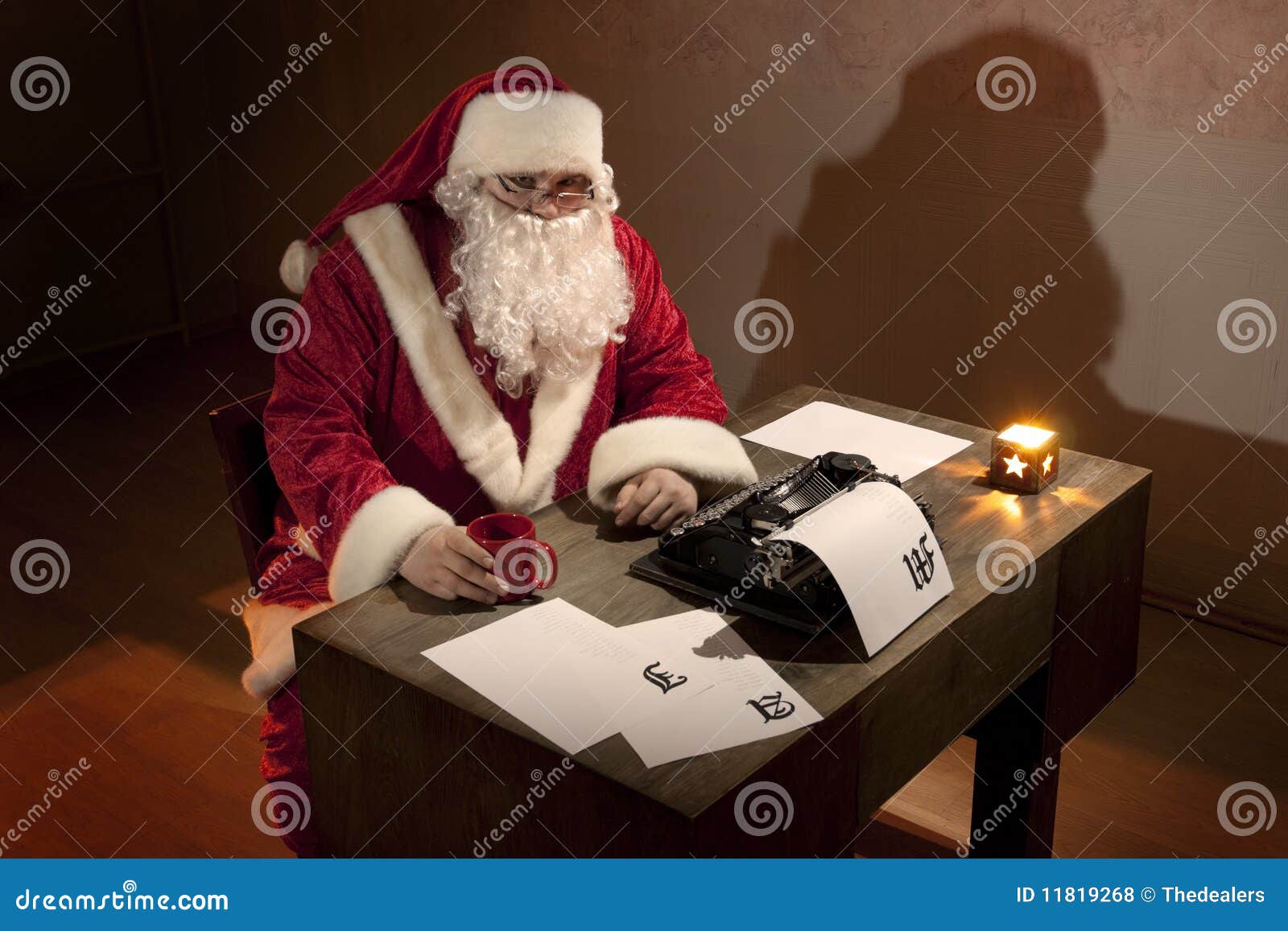 Santa Claus Sitting by a Desk Stock Photo - Image of keys, dark: 11819268