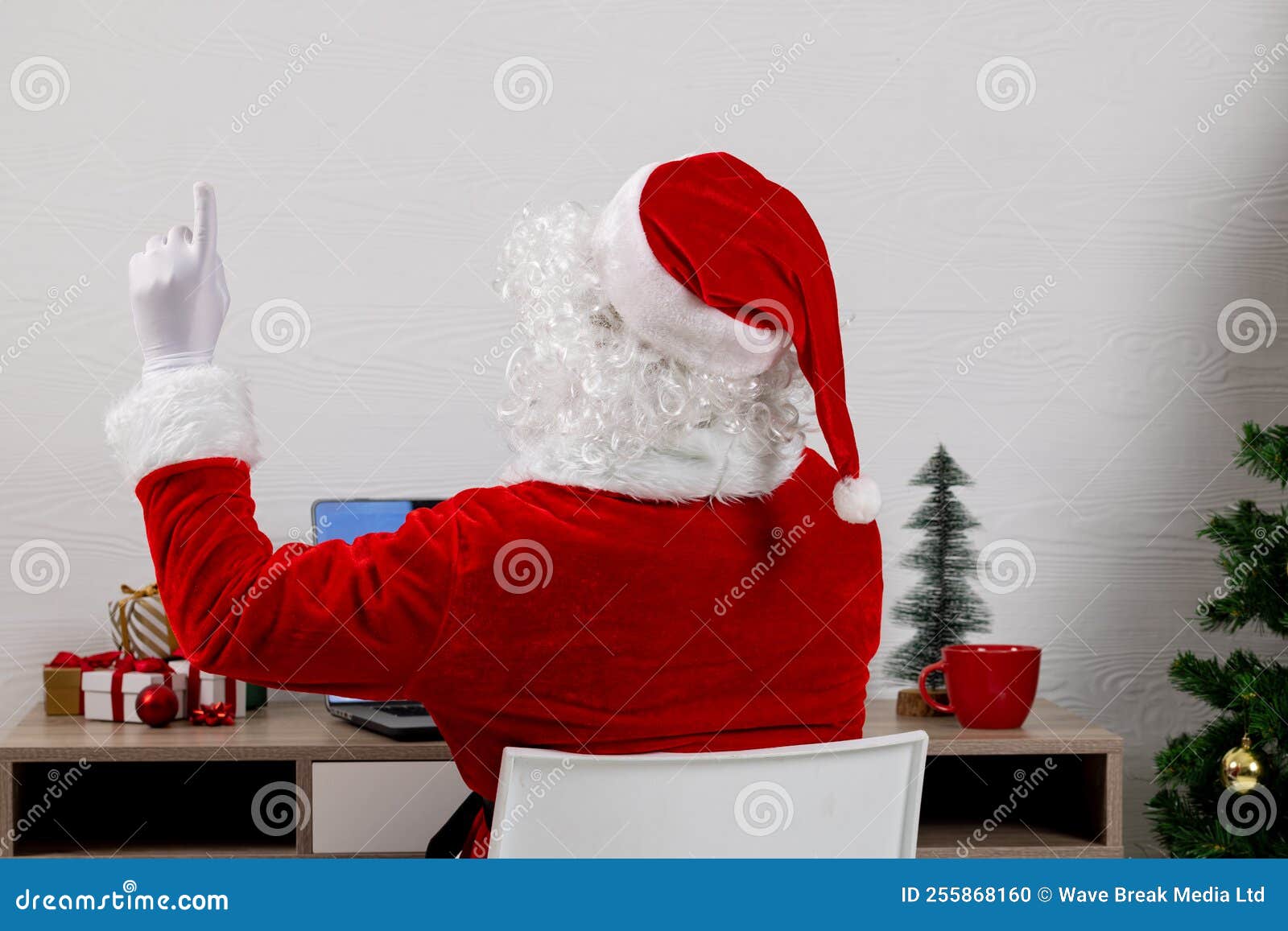 Santa Claus Sitting at the Desk and Using the Computer Stock Photo ...