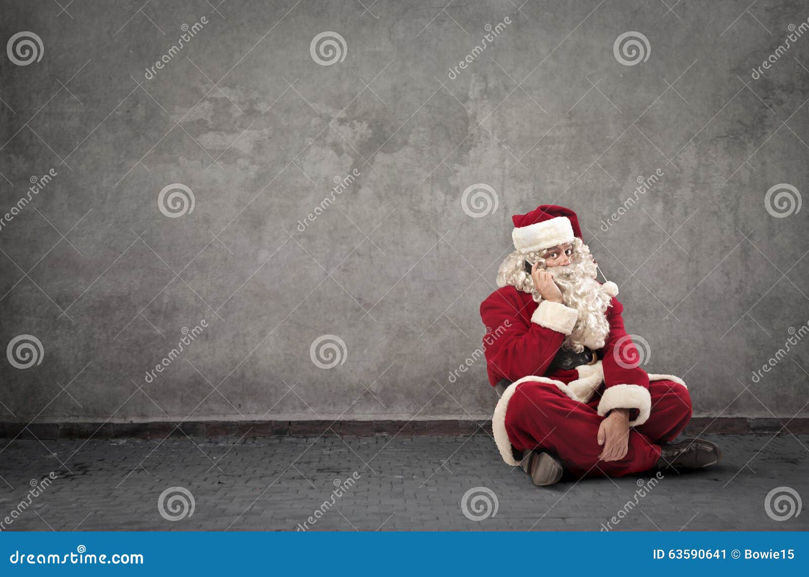 Santa Claus Sitting on the Ground Stock Image - Image of listen, ground ...
