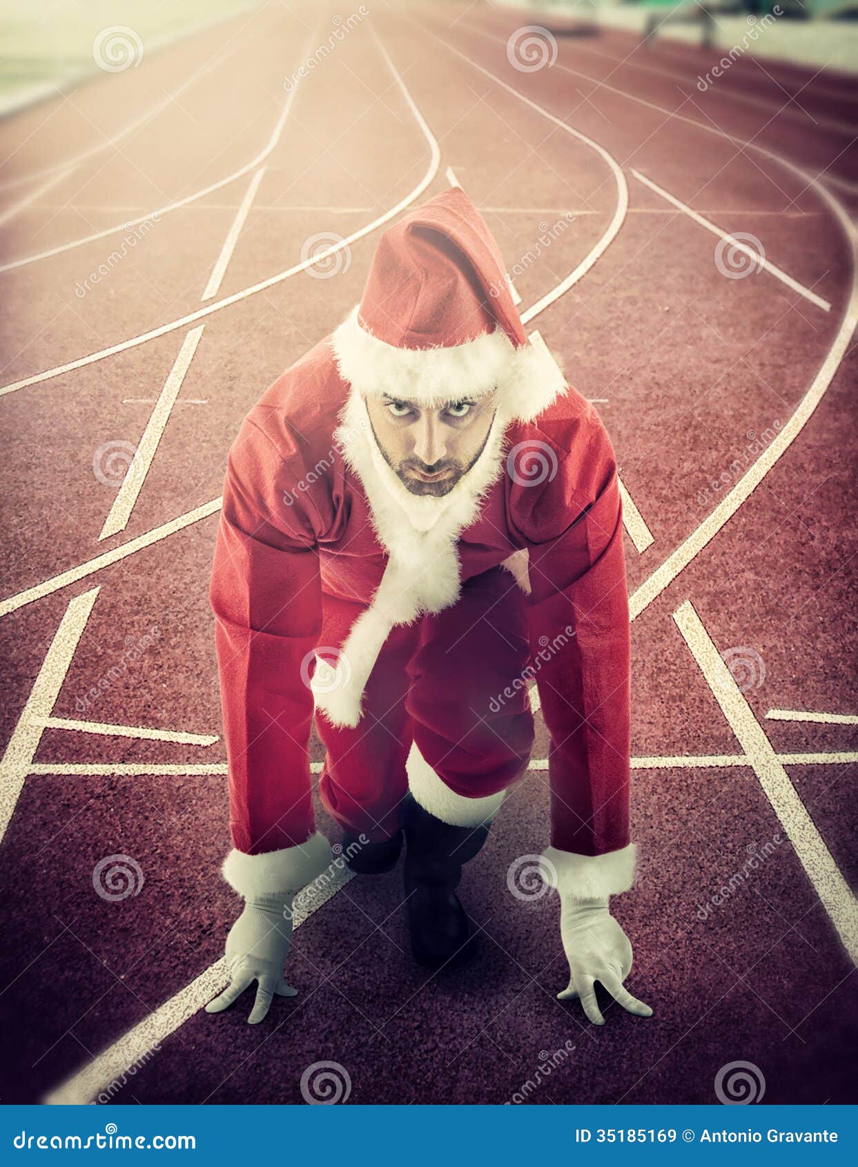 Santa Claus in the Starting Position on a Running Track Stock Image ...