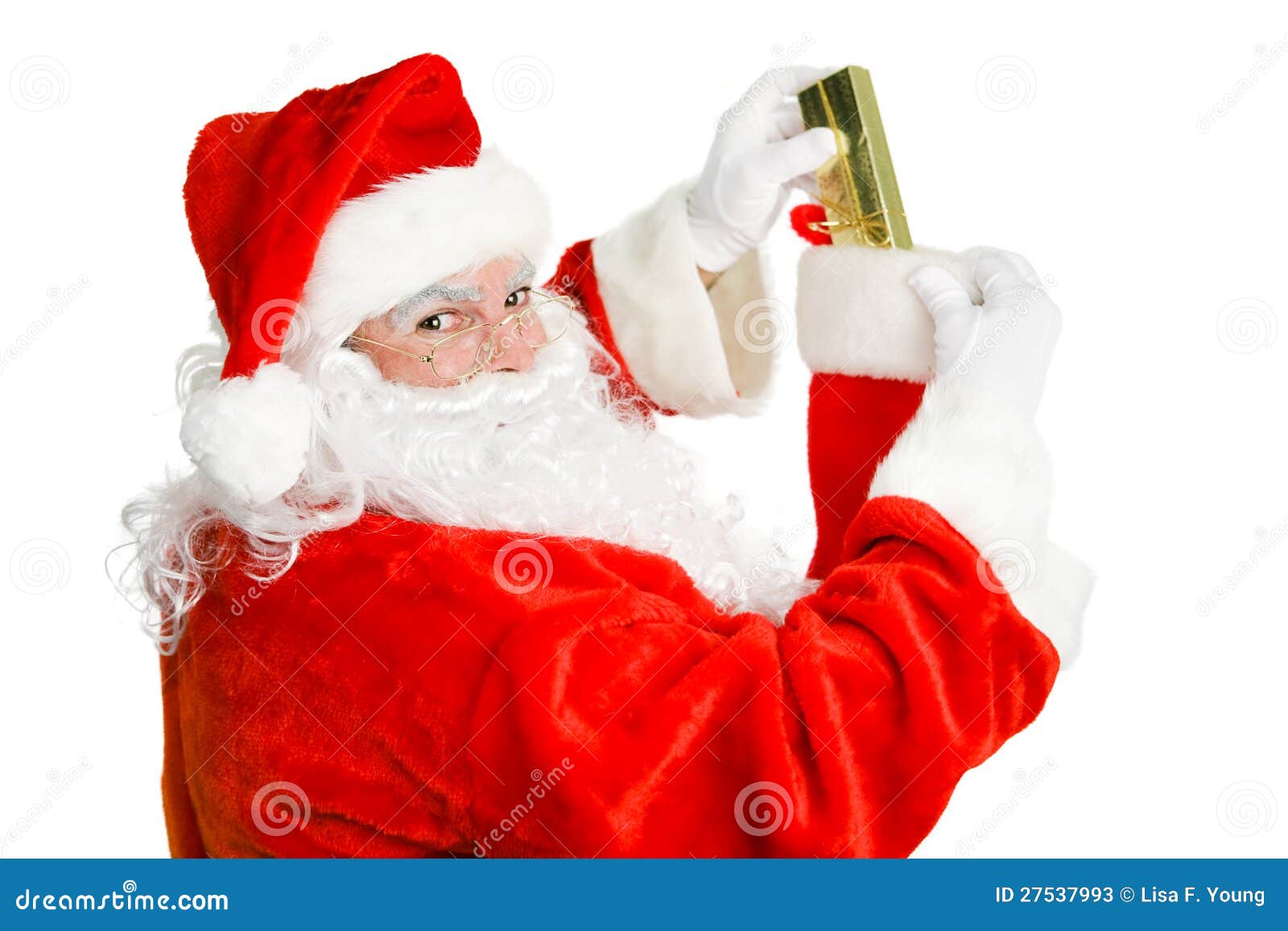 Santa Claus Stuffs a Christmas Stocking Stock Image - Image of december ...