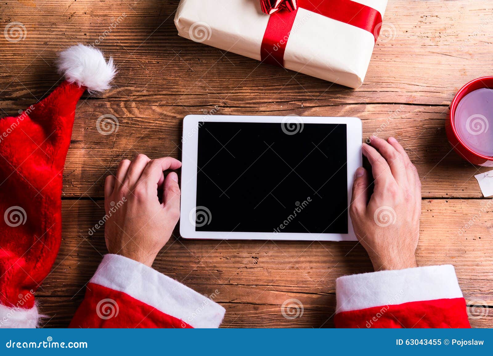 Santa Claus with tablet stock image. Image of elderly - 63043455