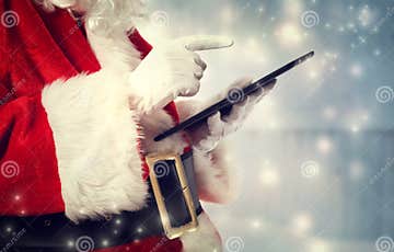 Santa Claus with tablet stock image. Image of present - 60632517