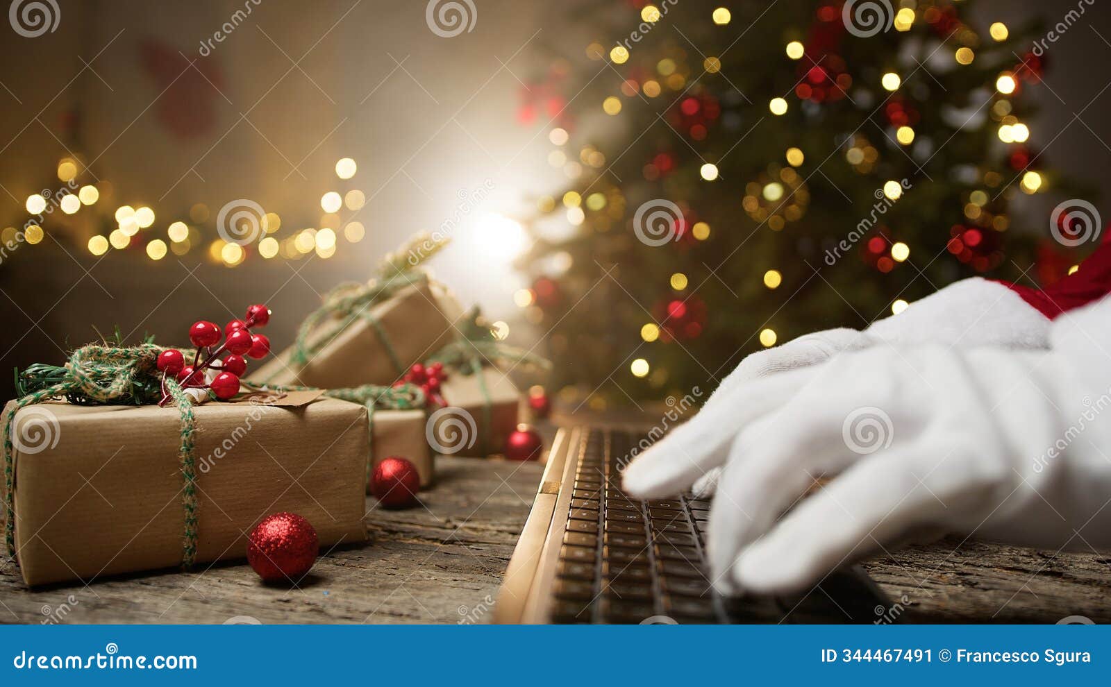 Santa Claus Tapping on Keyboard Under Christmas Tree Stock Image ...