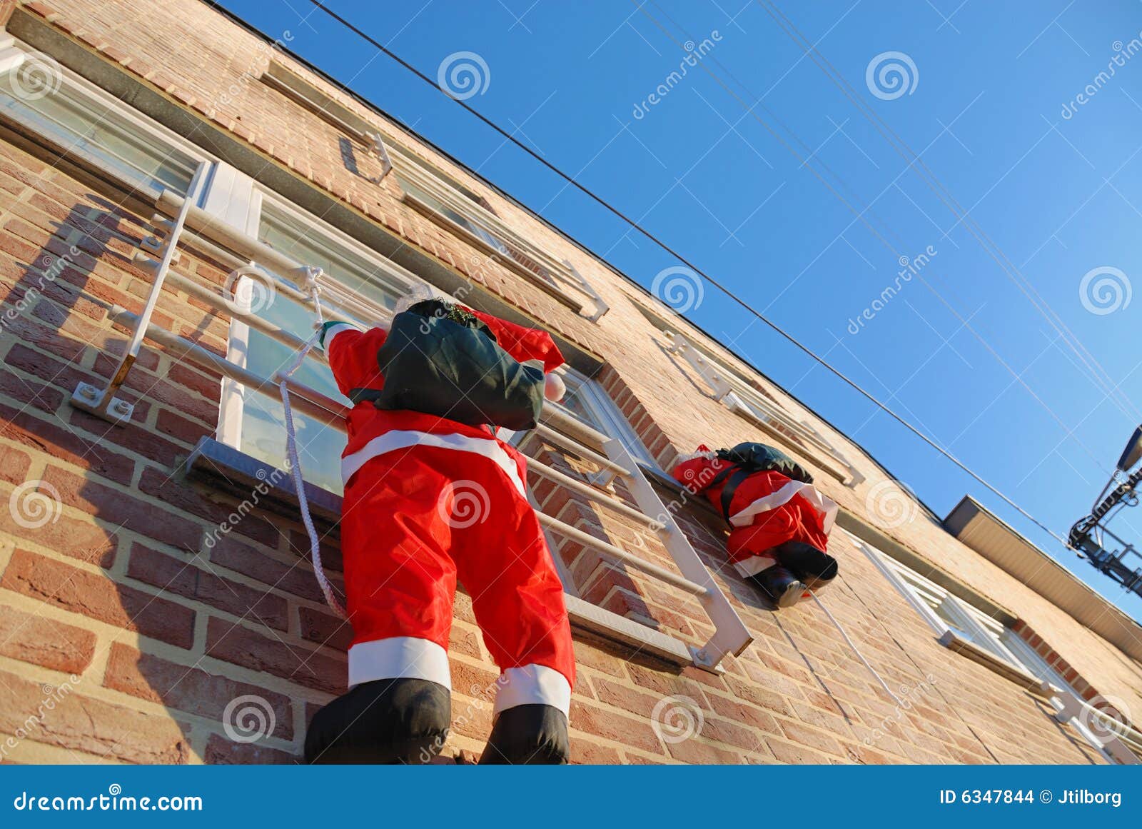 Santa Claus team in action stock photo. Image of santa - 6347844