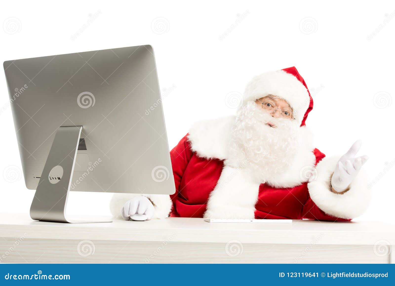 Santa Claus using computer stock image. Image of merry - 123119641