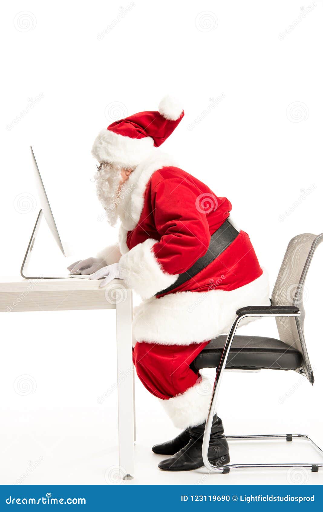 Santa Claus using computer stock photo. Image of christmastime - 123119690