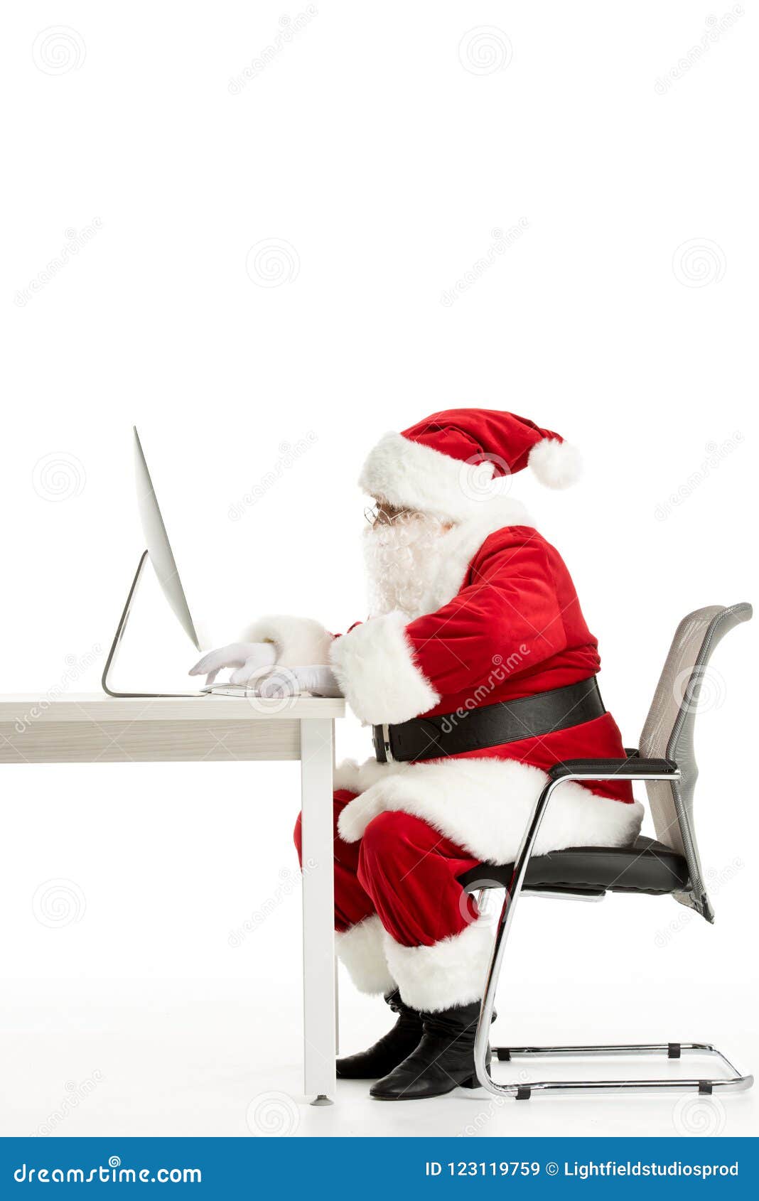 Santa Claus using computer stock image. Image of nicholas - 123119759
