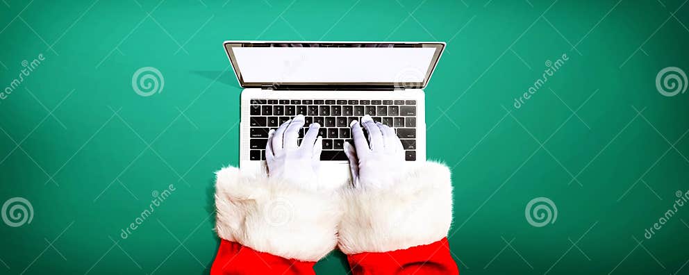 Santa Claus Using a Laptop Computer Stock Image - Image of concept ...