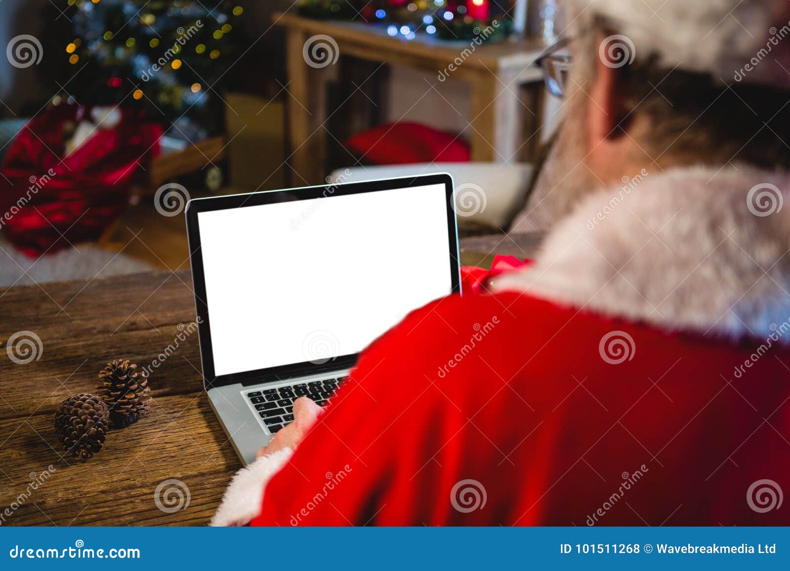 Santa Claus using laptop stock photo. Image of communication - 101511268