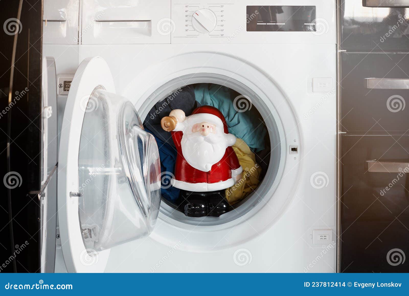 Santa Claus in the Washing Machine. Christmas Stock Photo - Image of ...