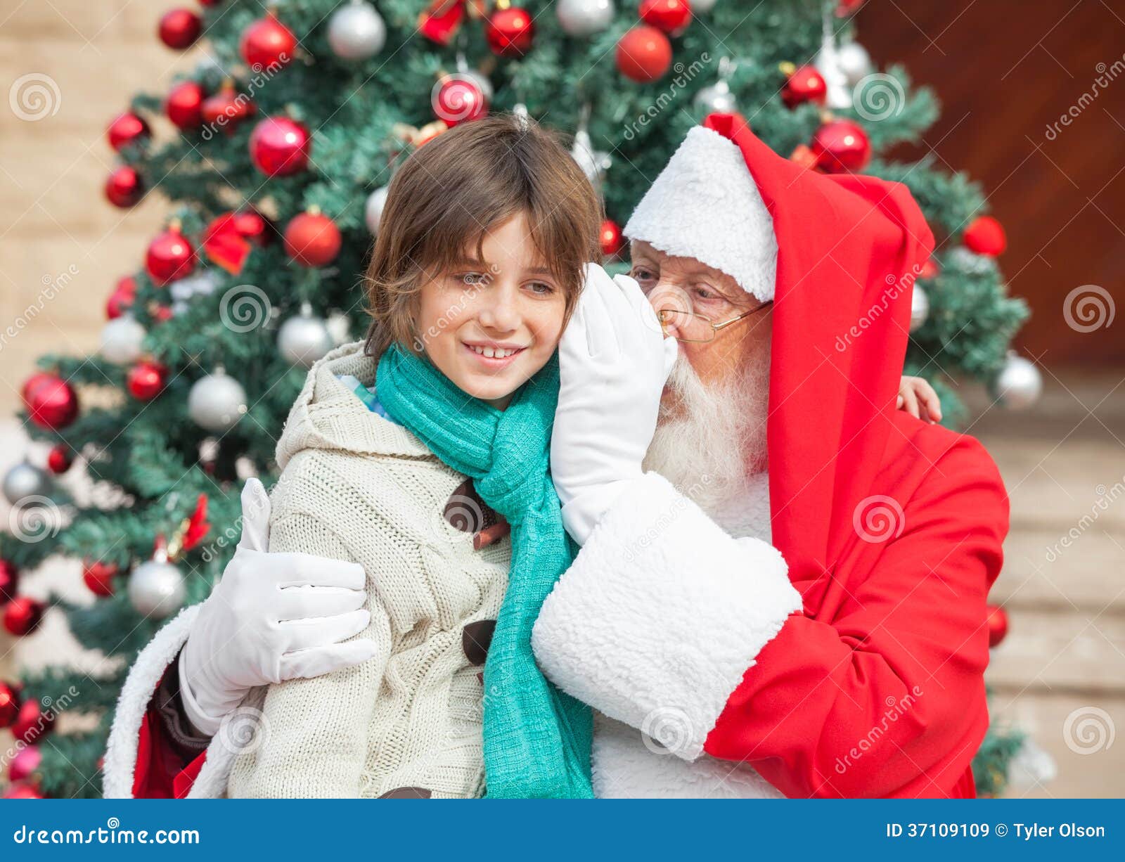 Santa Claus Whispering in Boys Ohr Stockbild - Bild von bedeckung ...