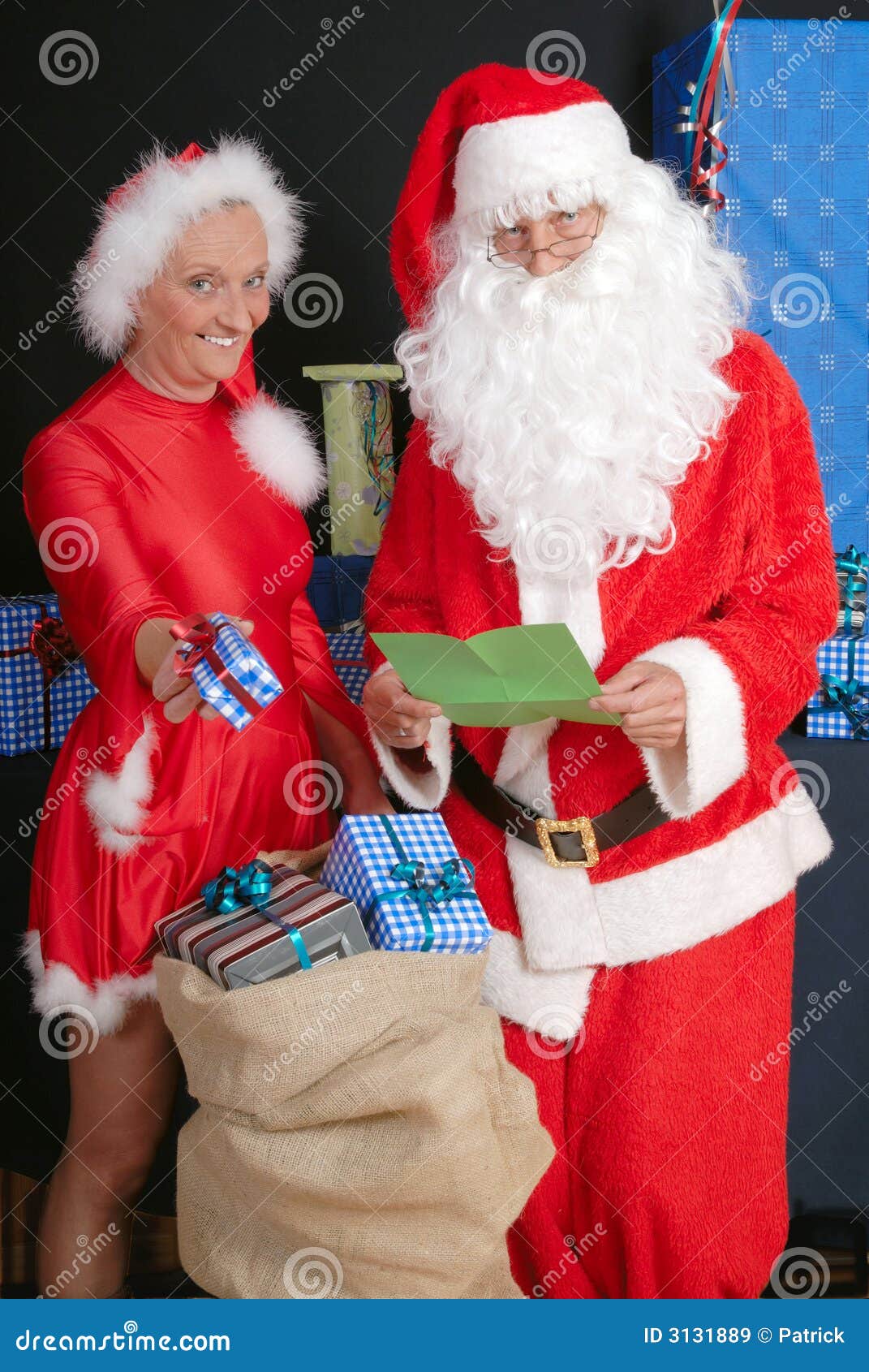 Santa Claus and woman stock image. Image of female, christmas - 3131889