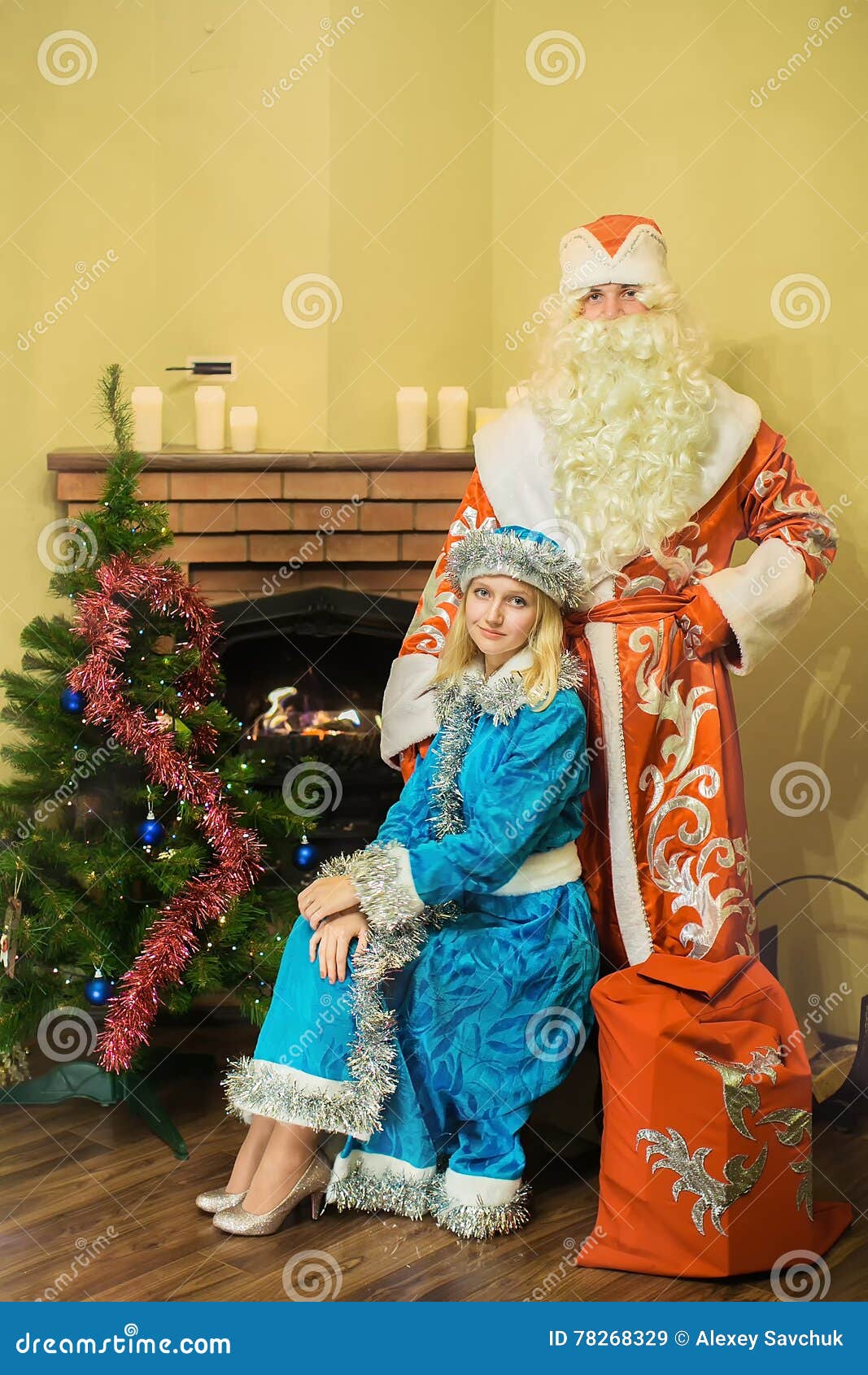 Santa Claus and the Young Maiden Stock Image - Image of arms, fire ...