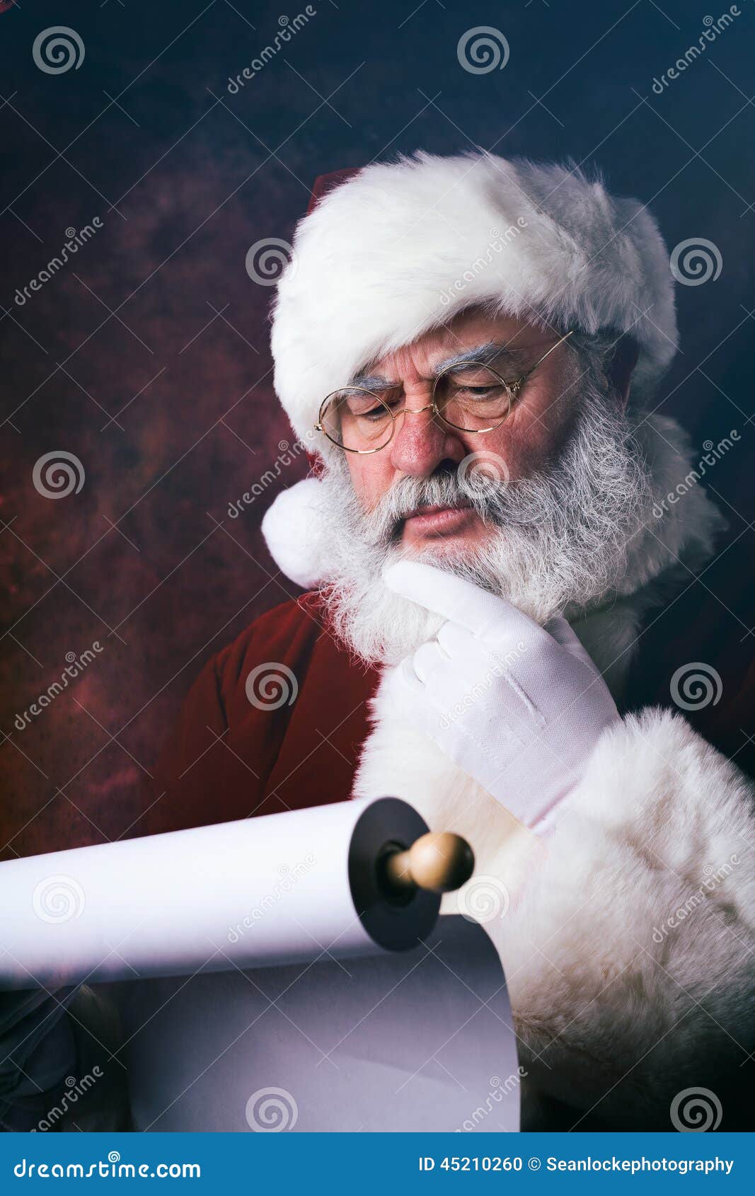 Santa: Disappointed Santa Going through the Naughty and Nice List Stock ...