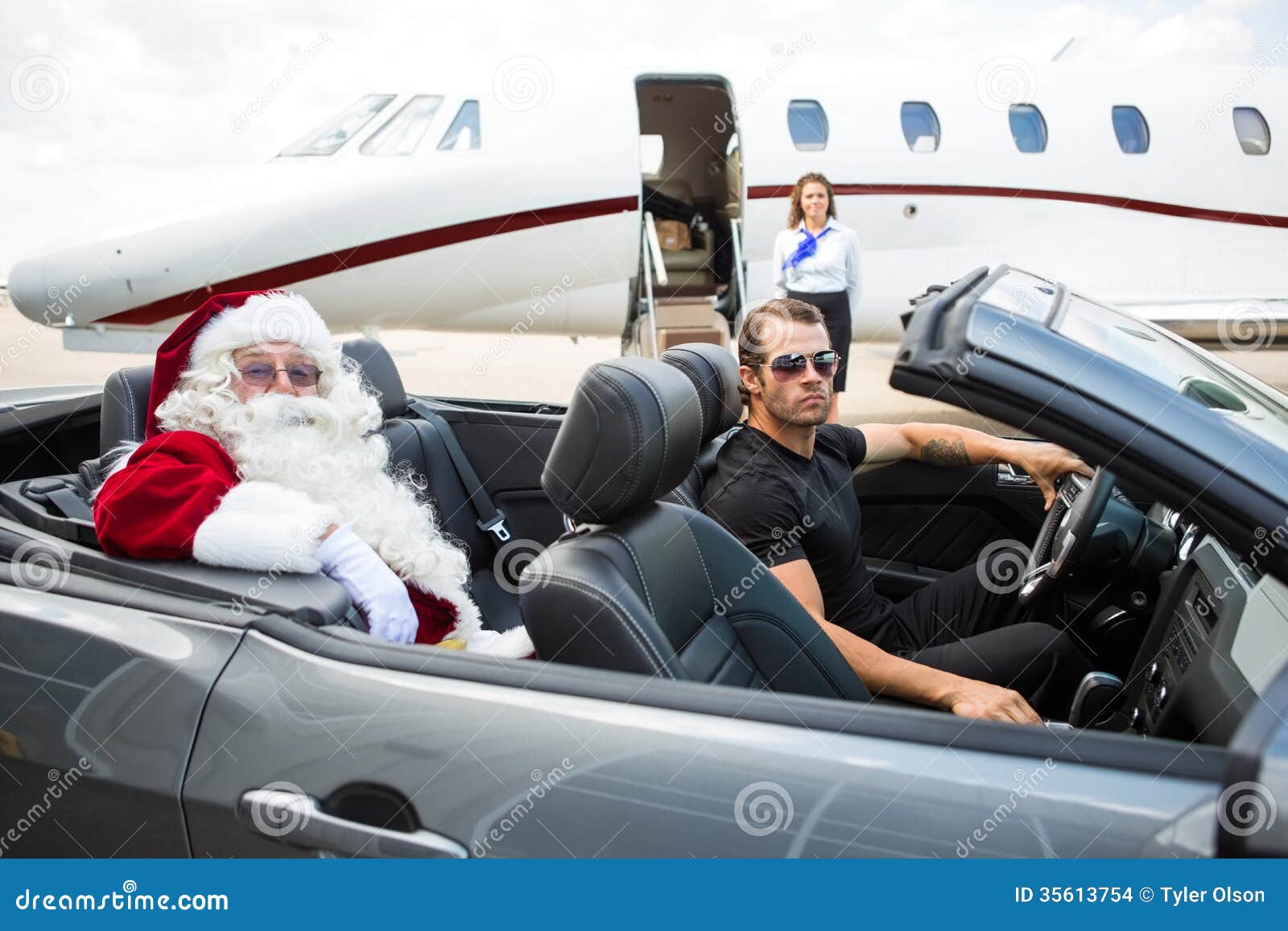 Santa and Driver in Convertible Con El Jet Adentro Foto de archivo ...