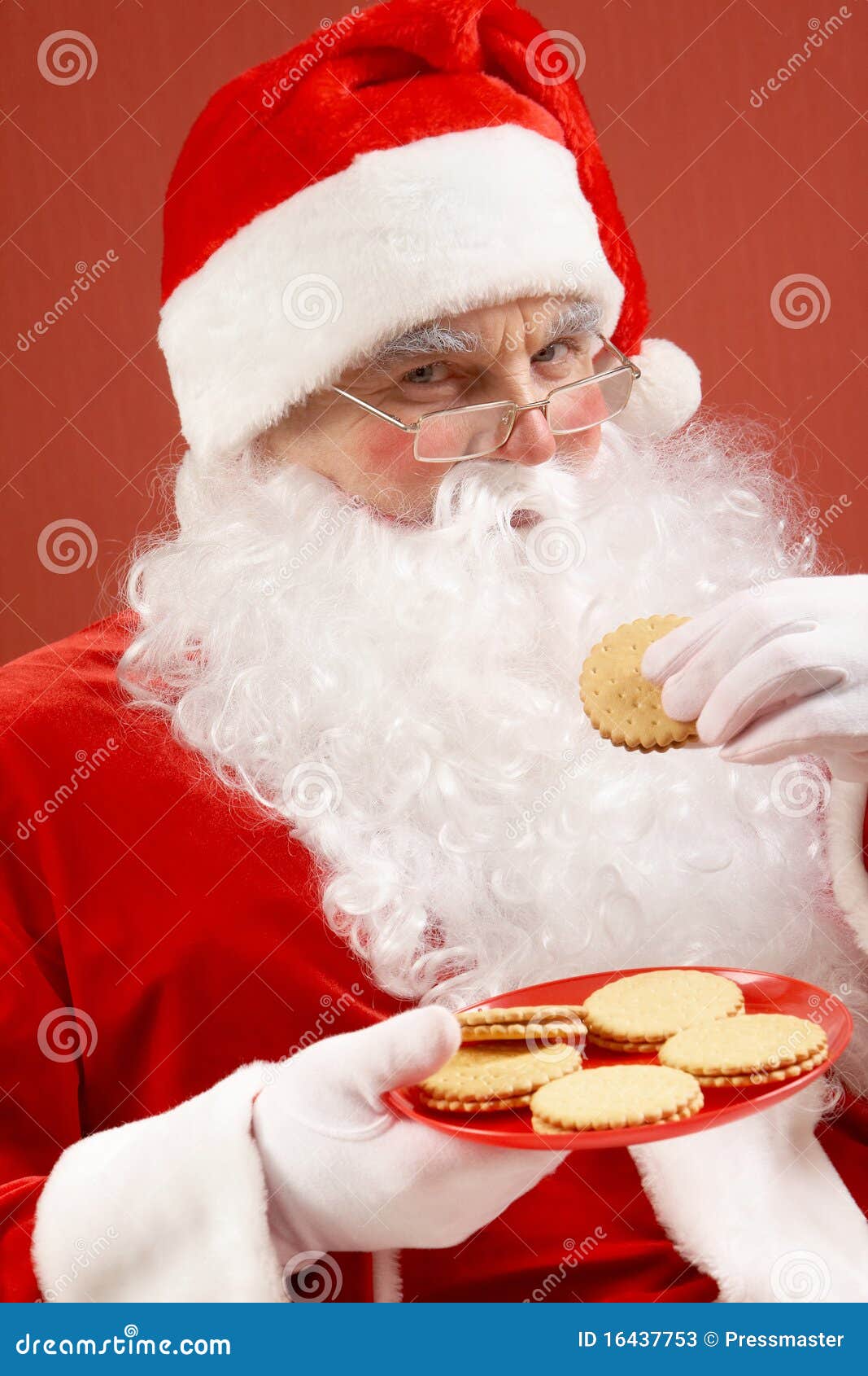 Santa eating stock image. Image of elderly, holds, people - 16437753