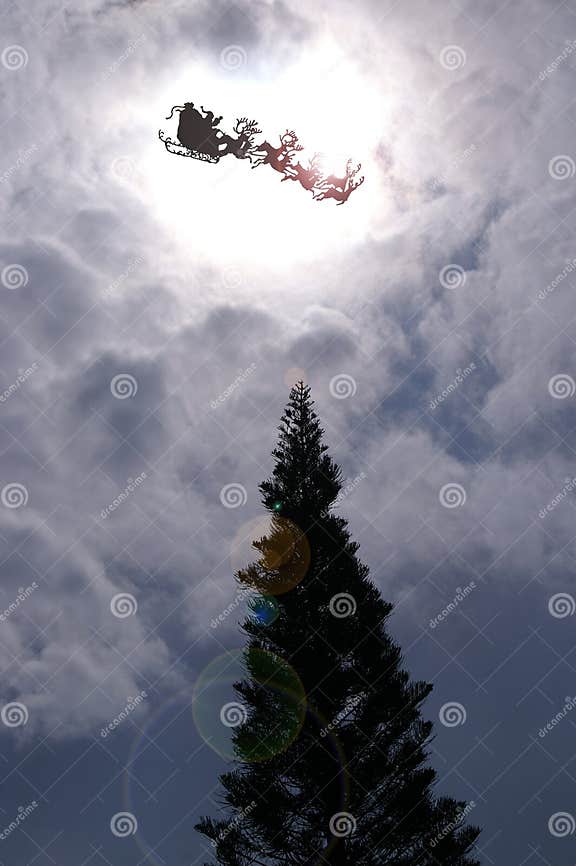 Santa flying sky stock photo. Image of year, pine, sunrise - 3923080