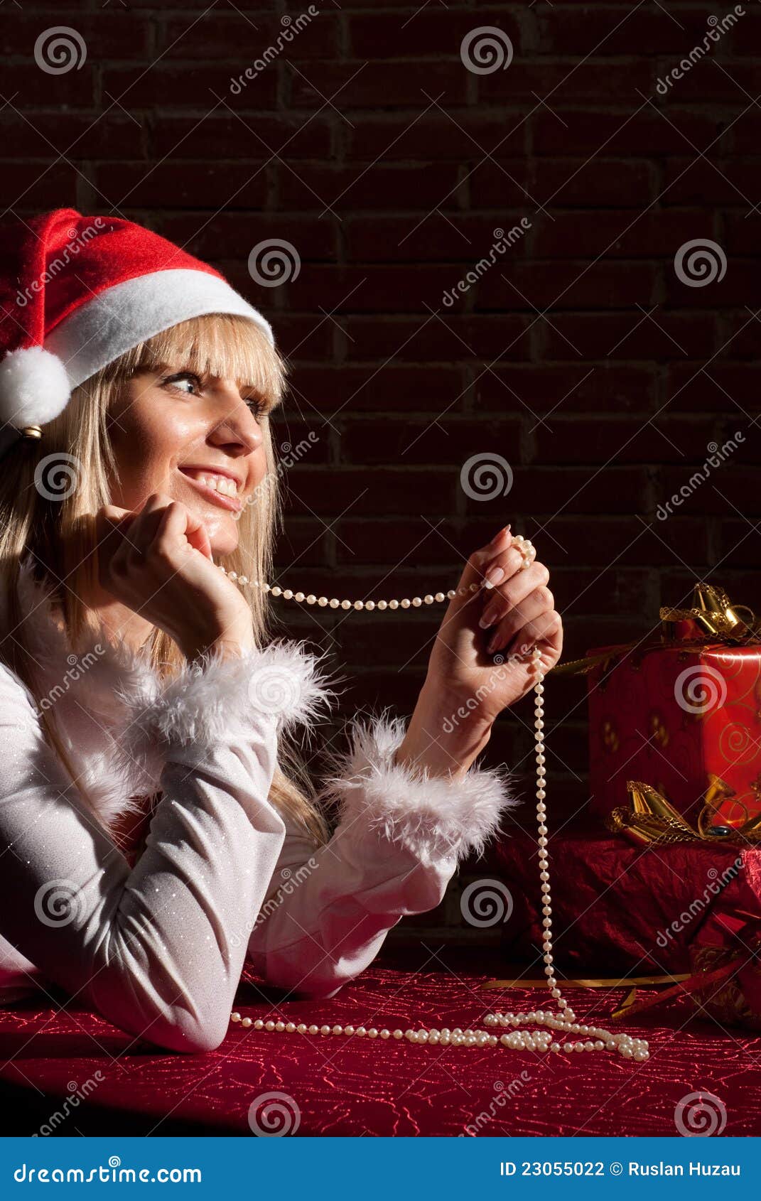 Santa girl with present stock photo. Image of person - 23055022