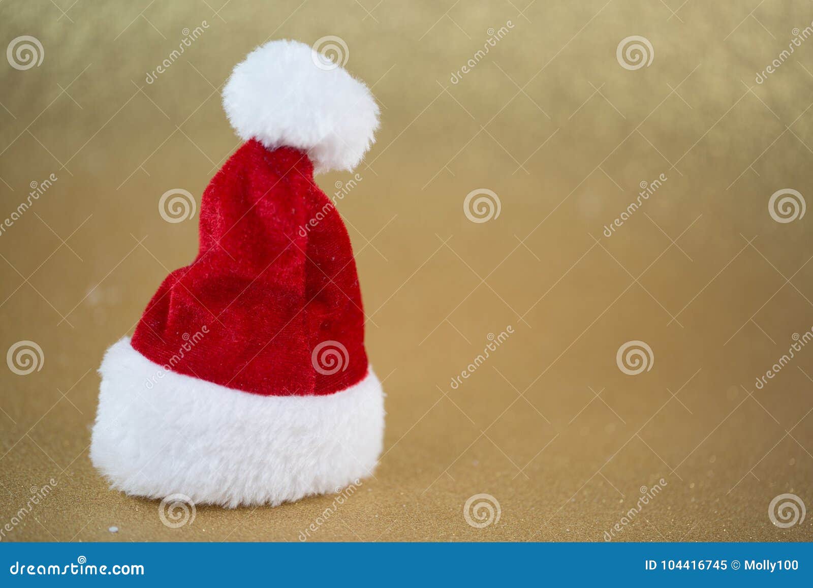 Santa Hat on a Gold Background Stock Image - Image of card, santa ...