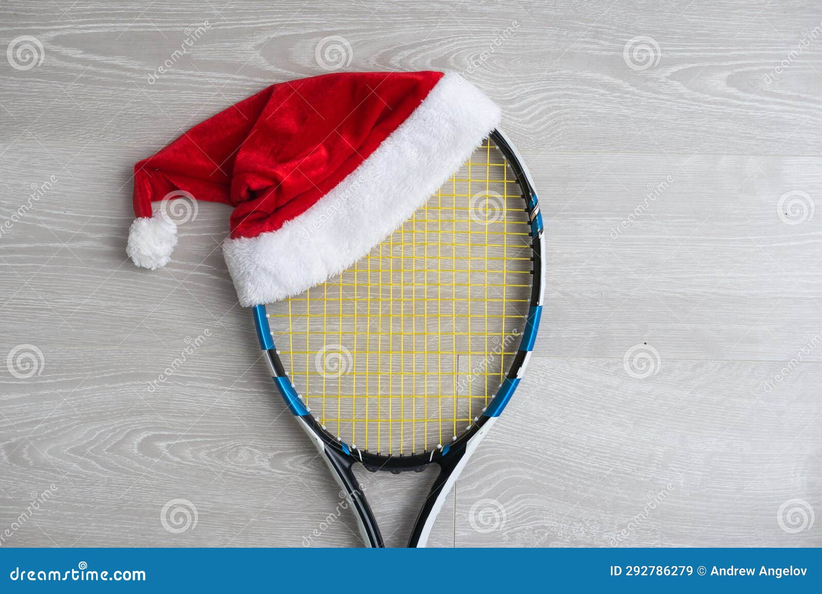 Santa Hat on Tennis Racket on White Background Stock Image - Image of ...