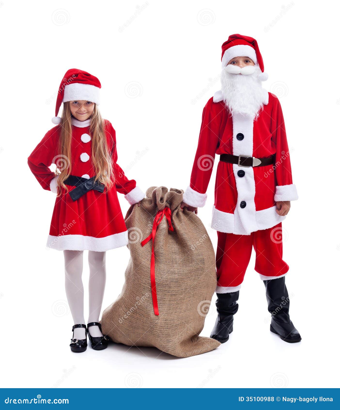 Santa and Helper with a Large Bag of Presents Stock Photo - Image of ...