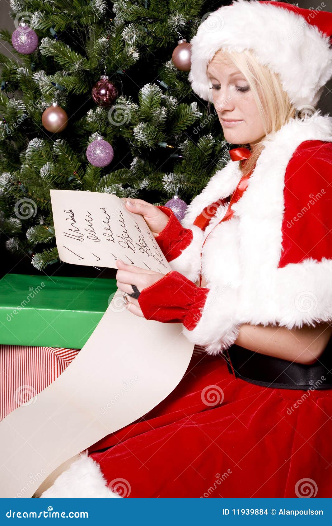 Santa Helper by Tree with List Stock Photo - Image of holiday, dress ...