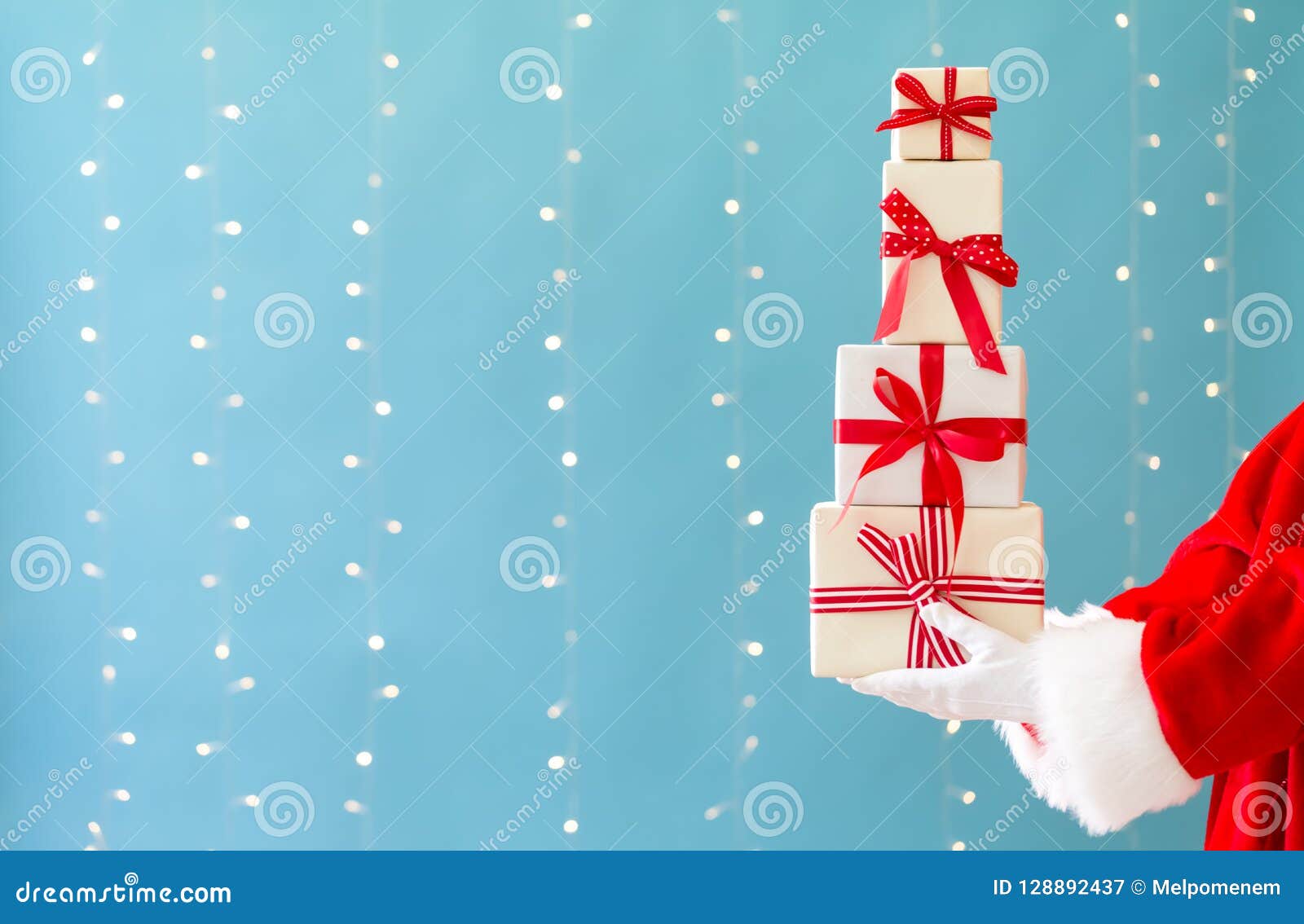 Santa Holding Christmas Gift Boxes Stock Image - Image of assortment ...