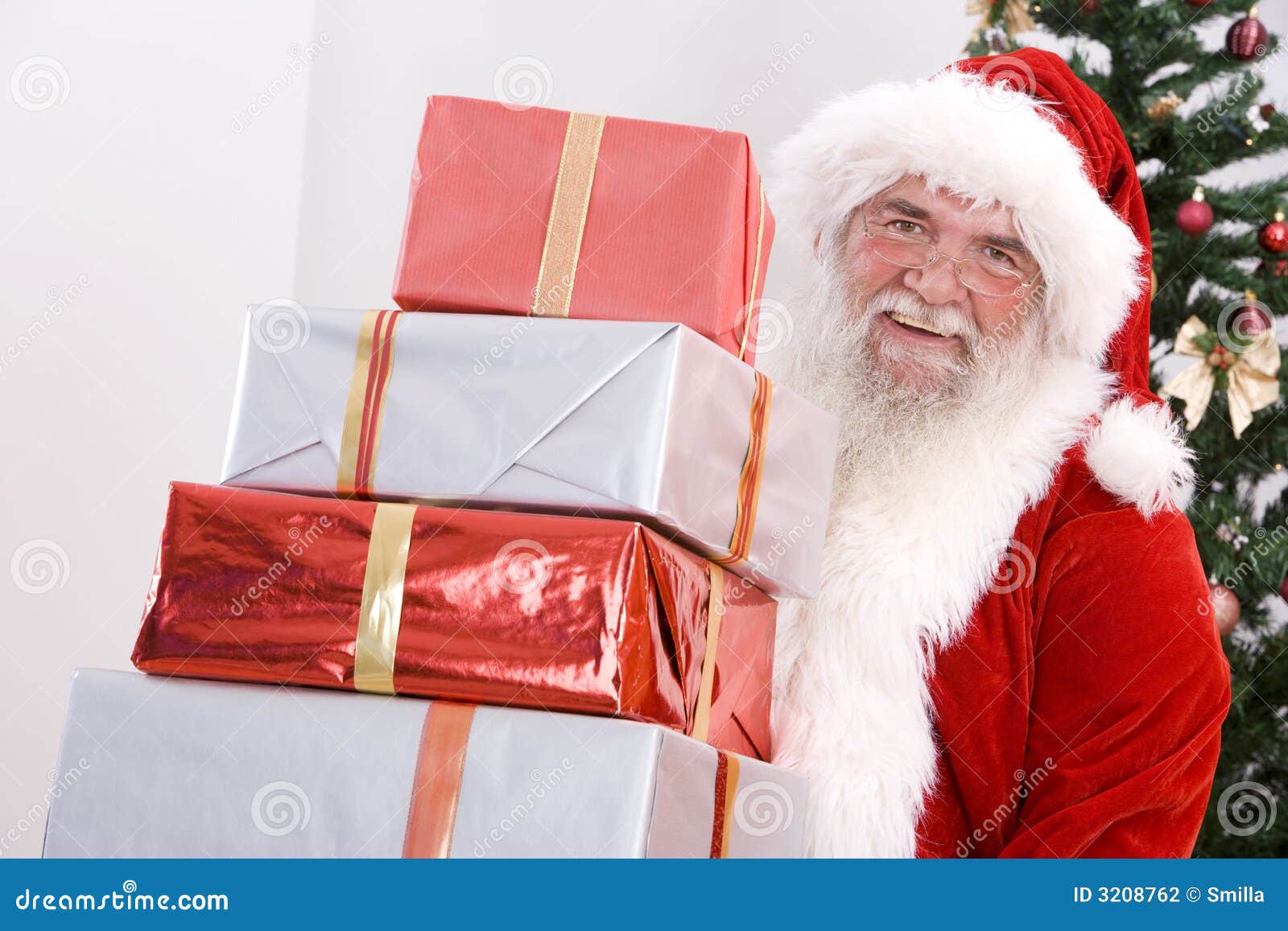 Santa holding gifts stock photo. Image of decoration, claus - 3208762