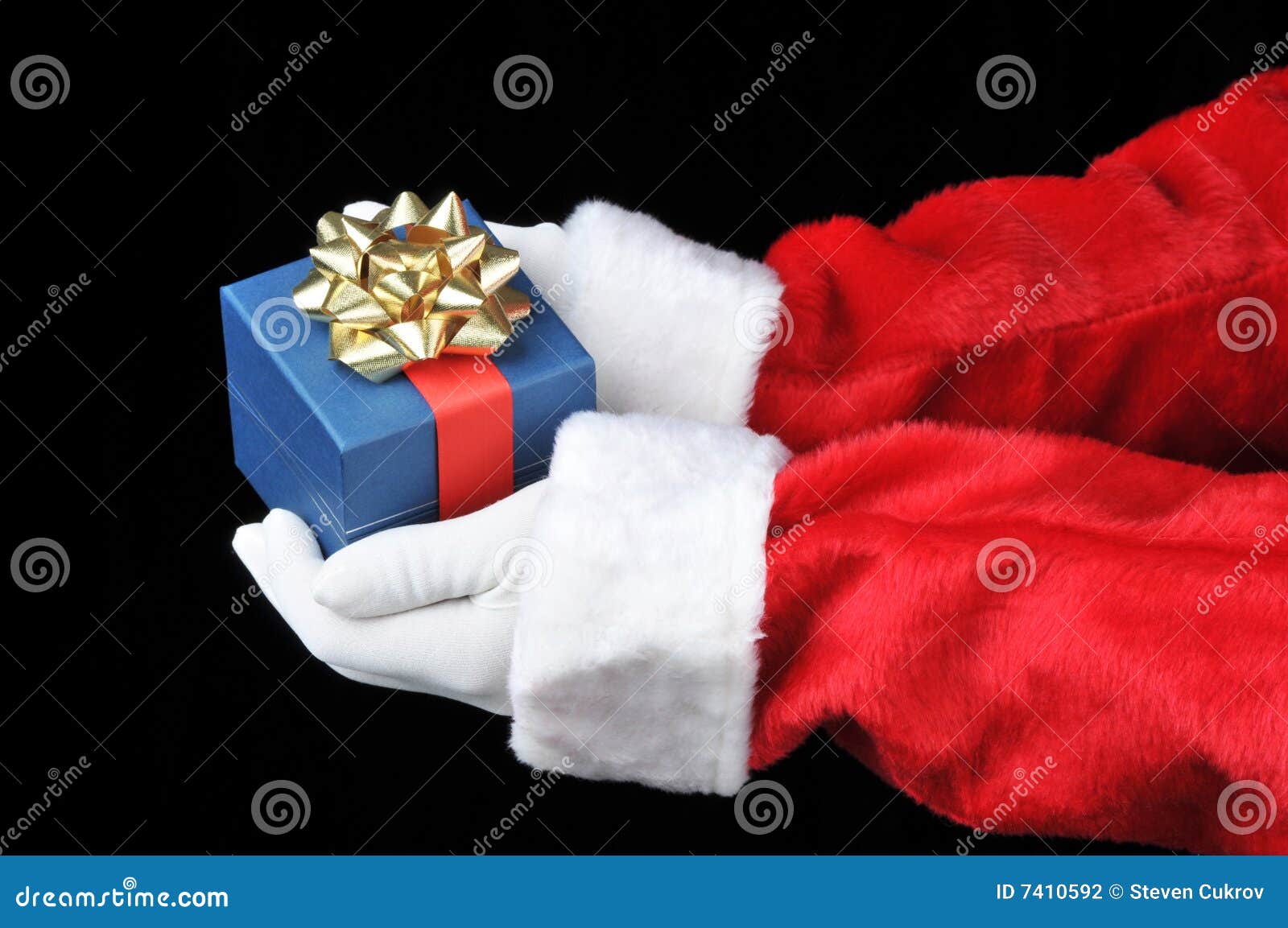 Santa Holding Present in Both Hands Stock Photo - Image of present ...