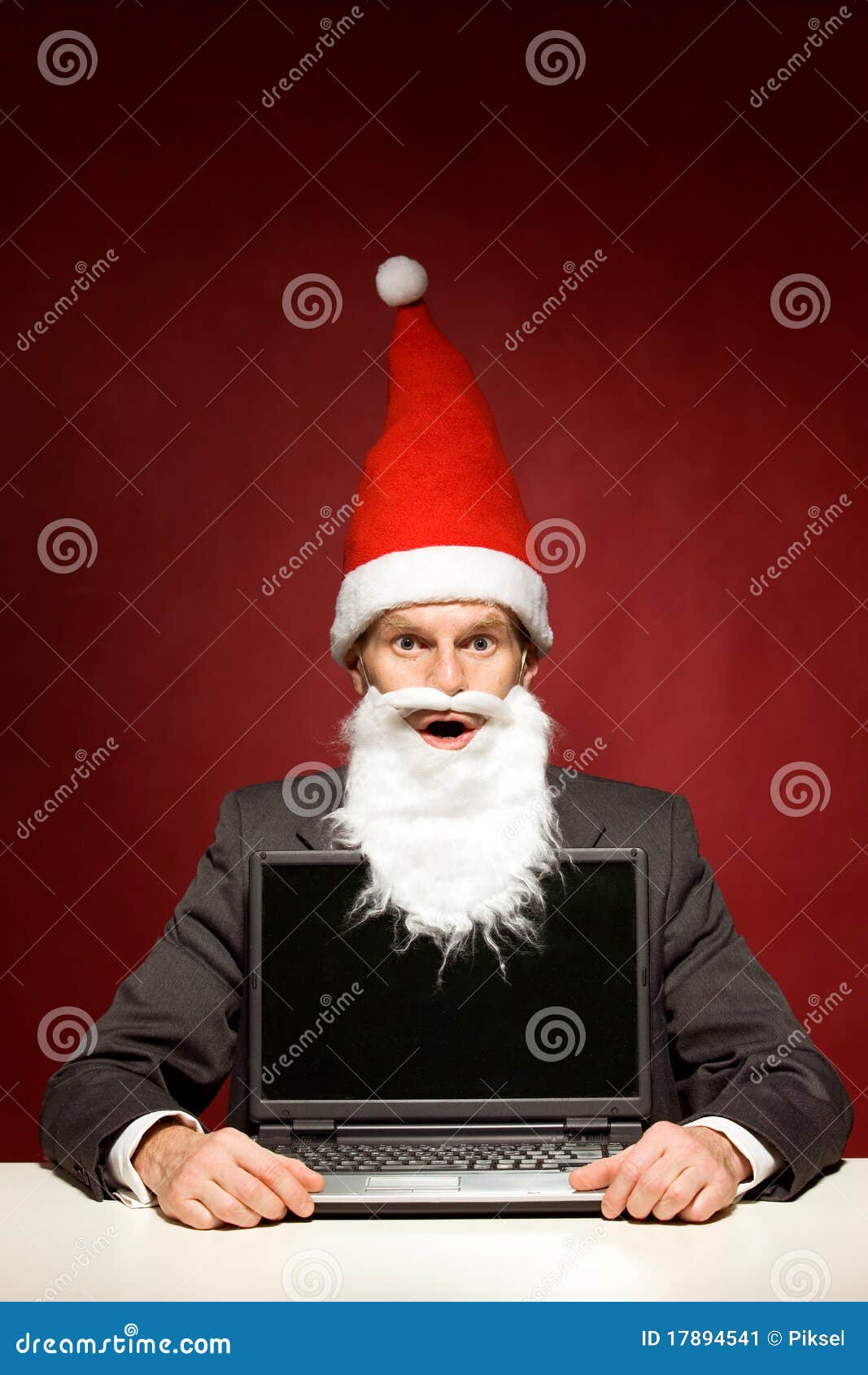 Santa with laptop stock image. Image of expression, studio - 17894541