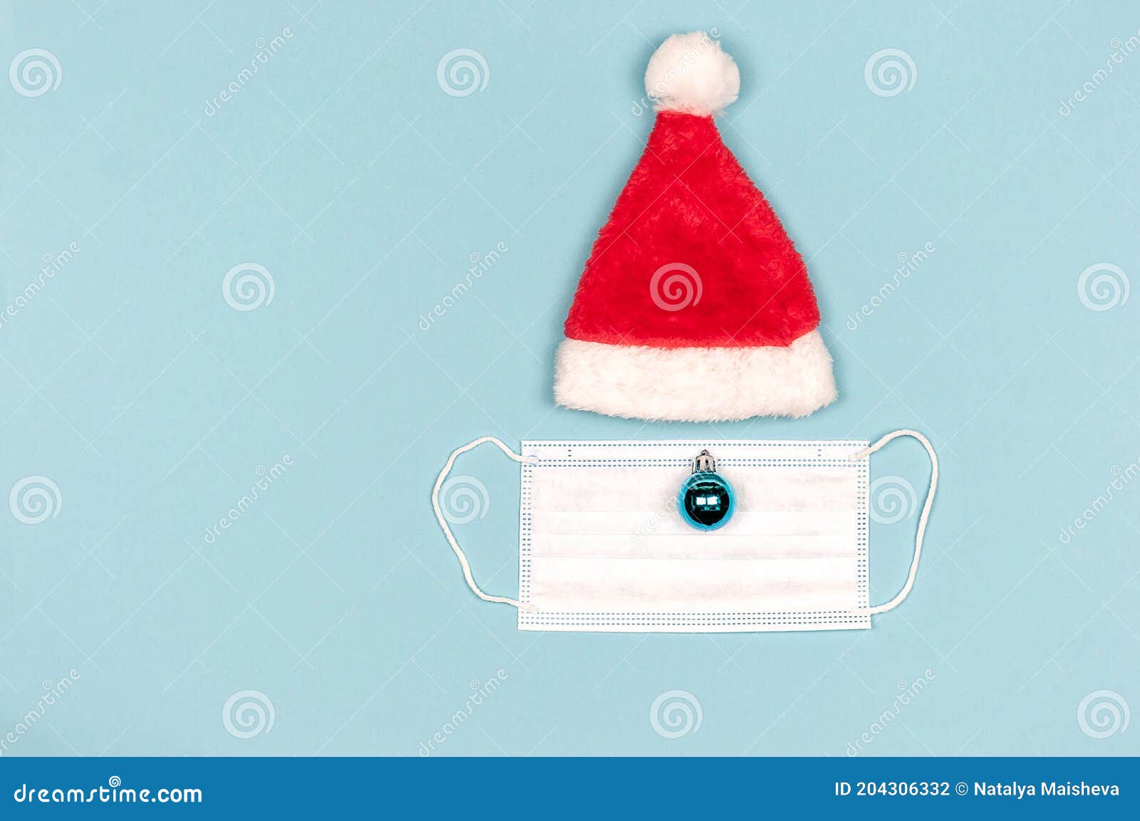 Santa`s Mask In Hand Protrudes From A Hole In Yellow Background ...