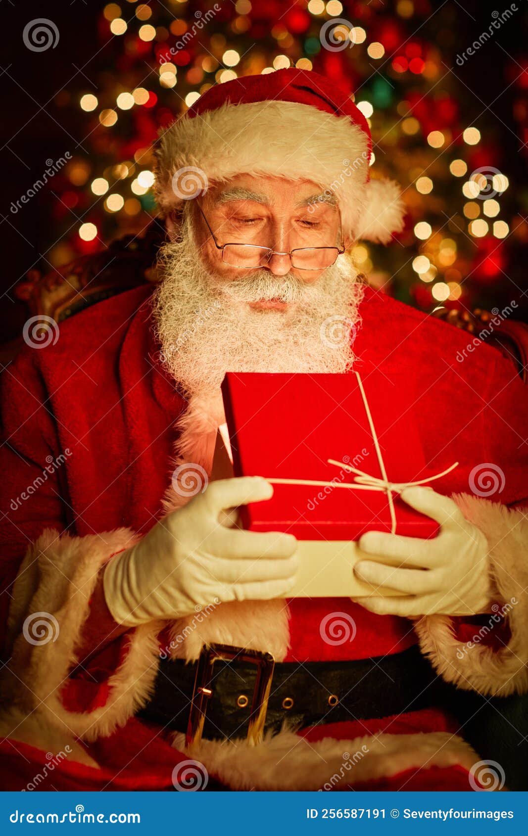 Santa Opening Magic Present Stock Image - Image of magic, open: 256587191